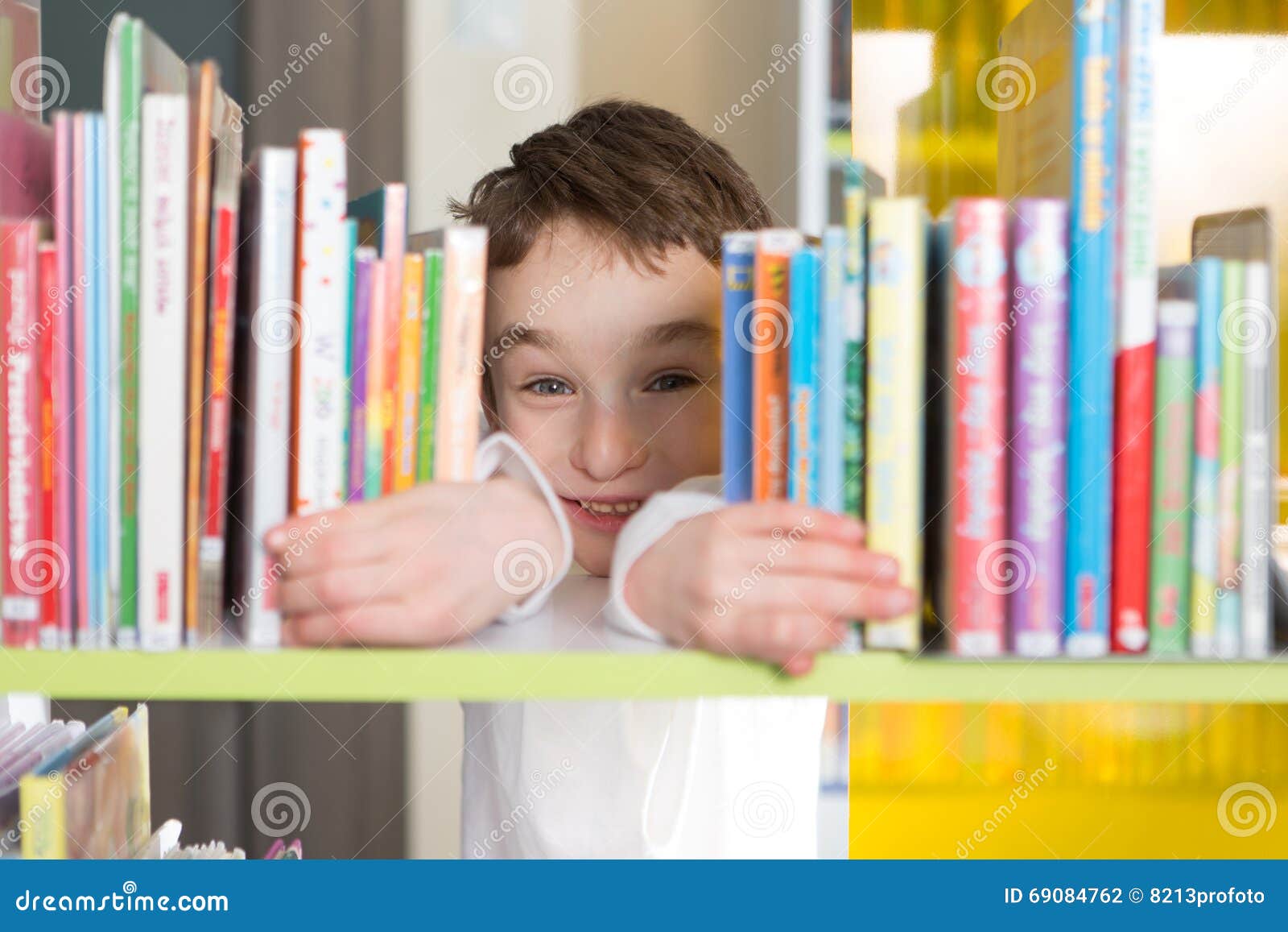 Cute Boy Reading Book in Library Stock Photo - Image of portrait, desk ...