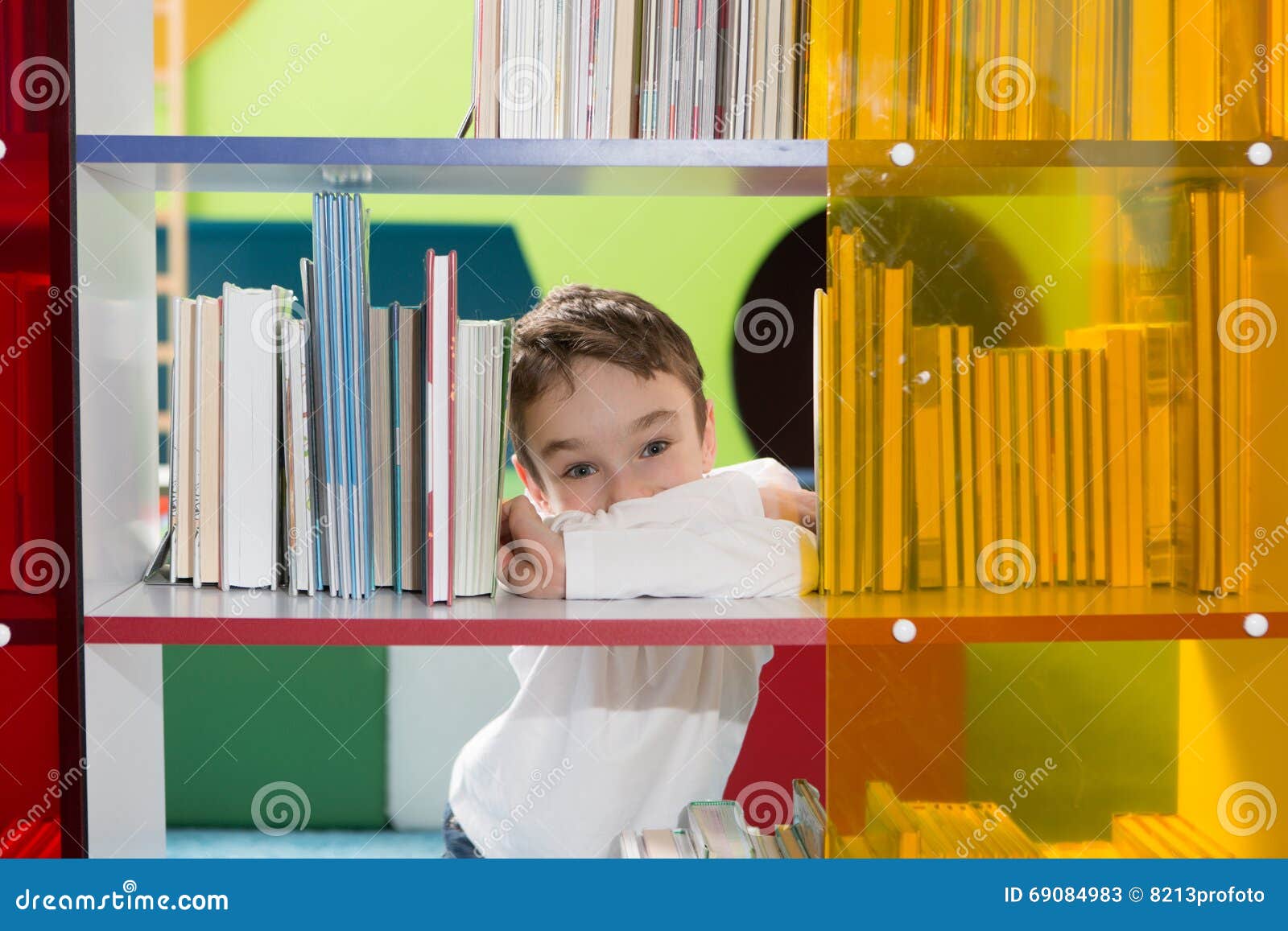 Cute Boy Reading Book in Library Stock Image - Image of children ...