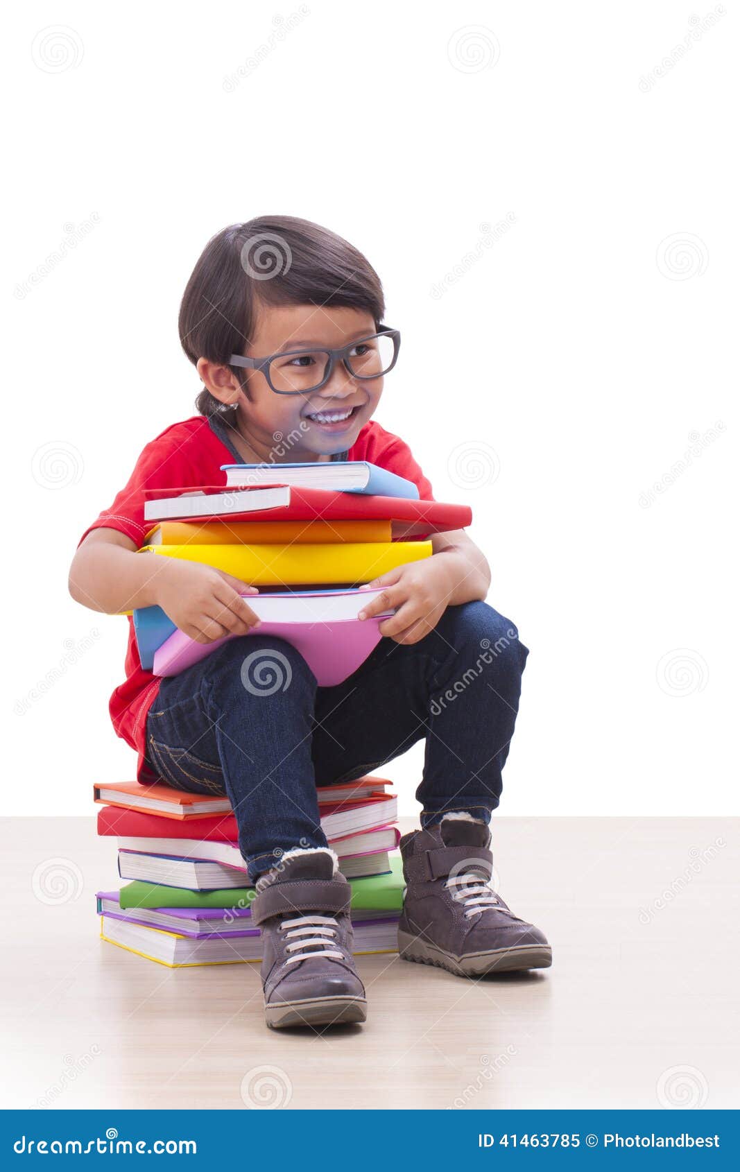 Cute boy reading a book stock image. Image of pupil, pile - 41463785