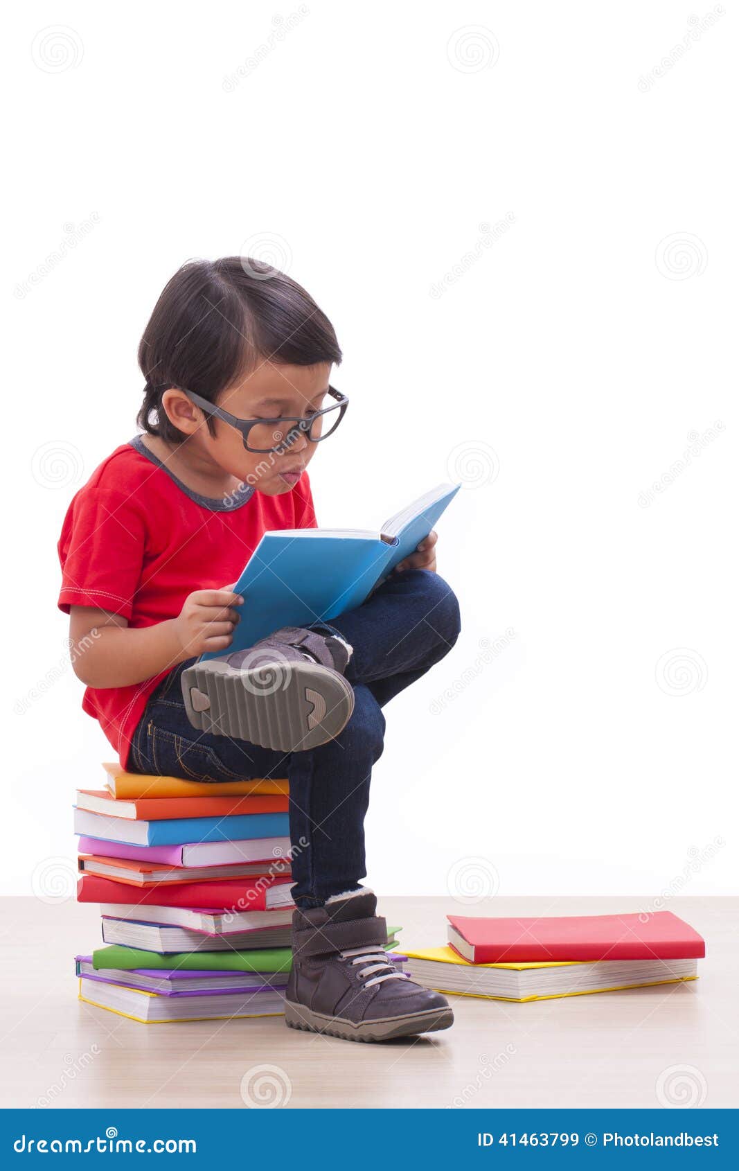 Cute boy reading a book stock image. Image of learn, reading - 41463799