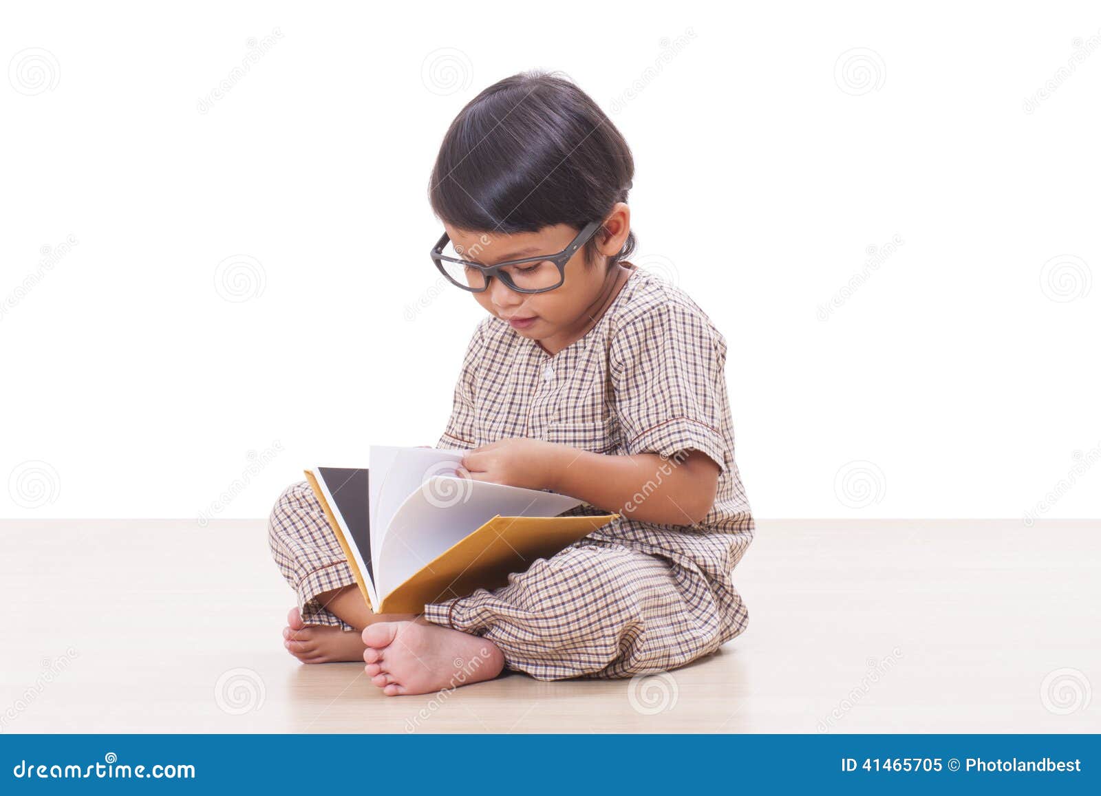 Cute boy is reading a book stock image. Image of cute - 41465705