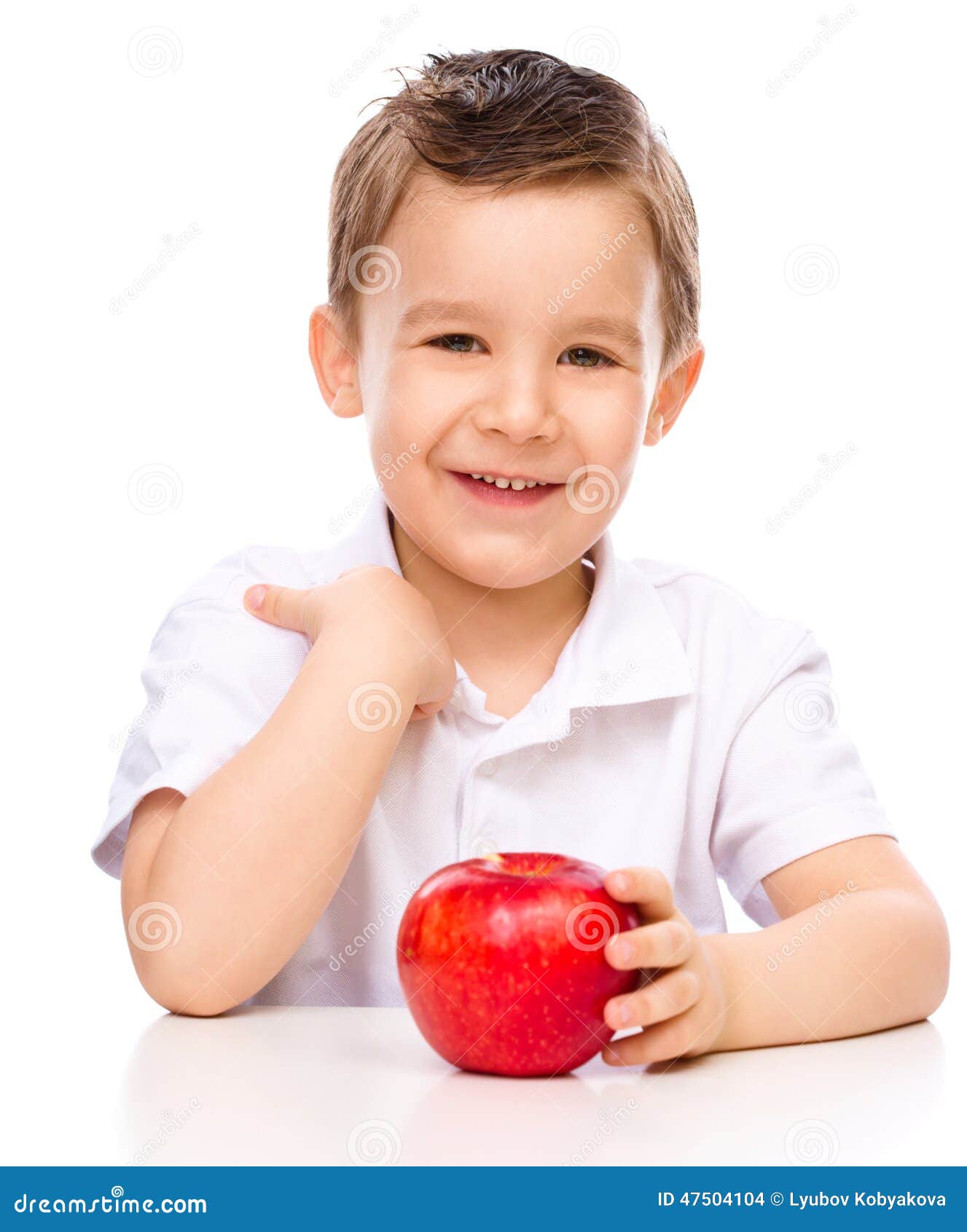 Cute boy with red apples stock photo. Image of indoors - 47504104