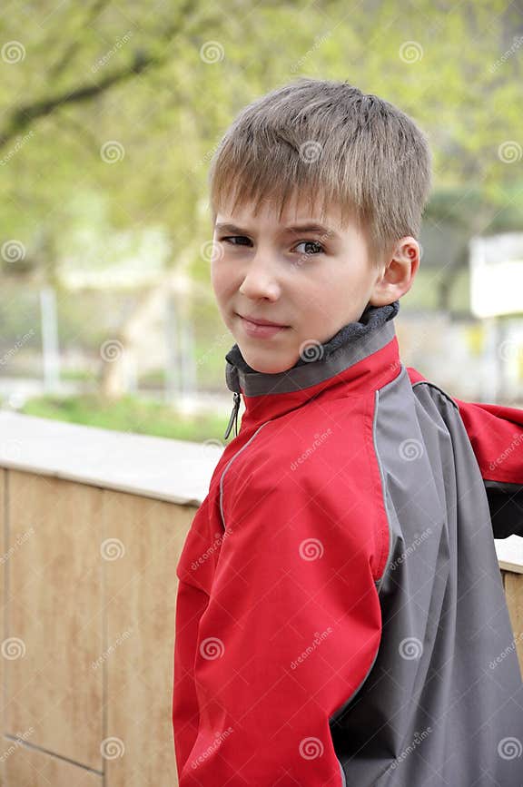 Cute boy in red jacket stock image. Image of young, lifestyle - 24572453