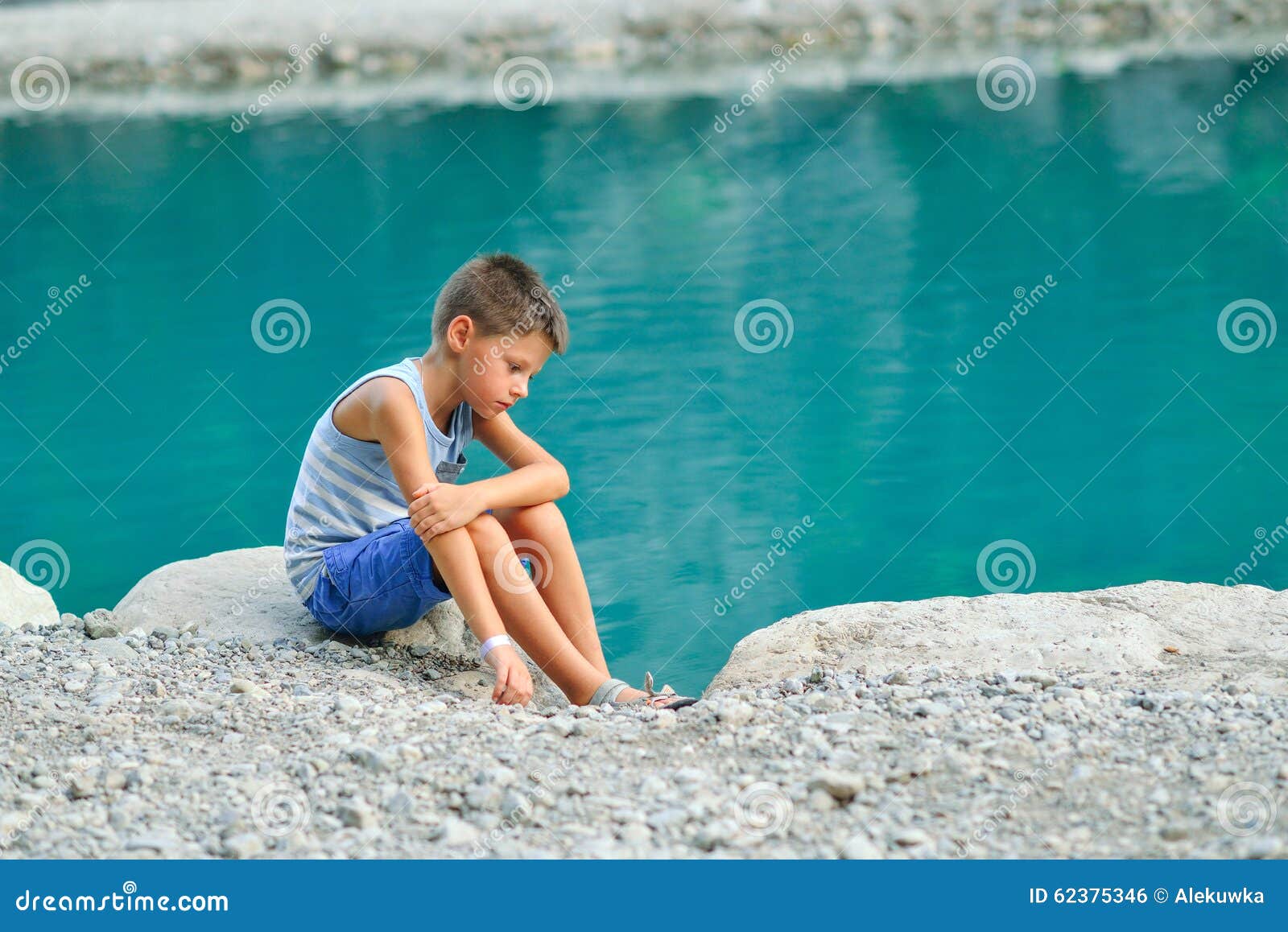 Cute boy on the river stock photo. Image of portrait - 62375346