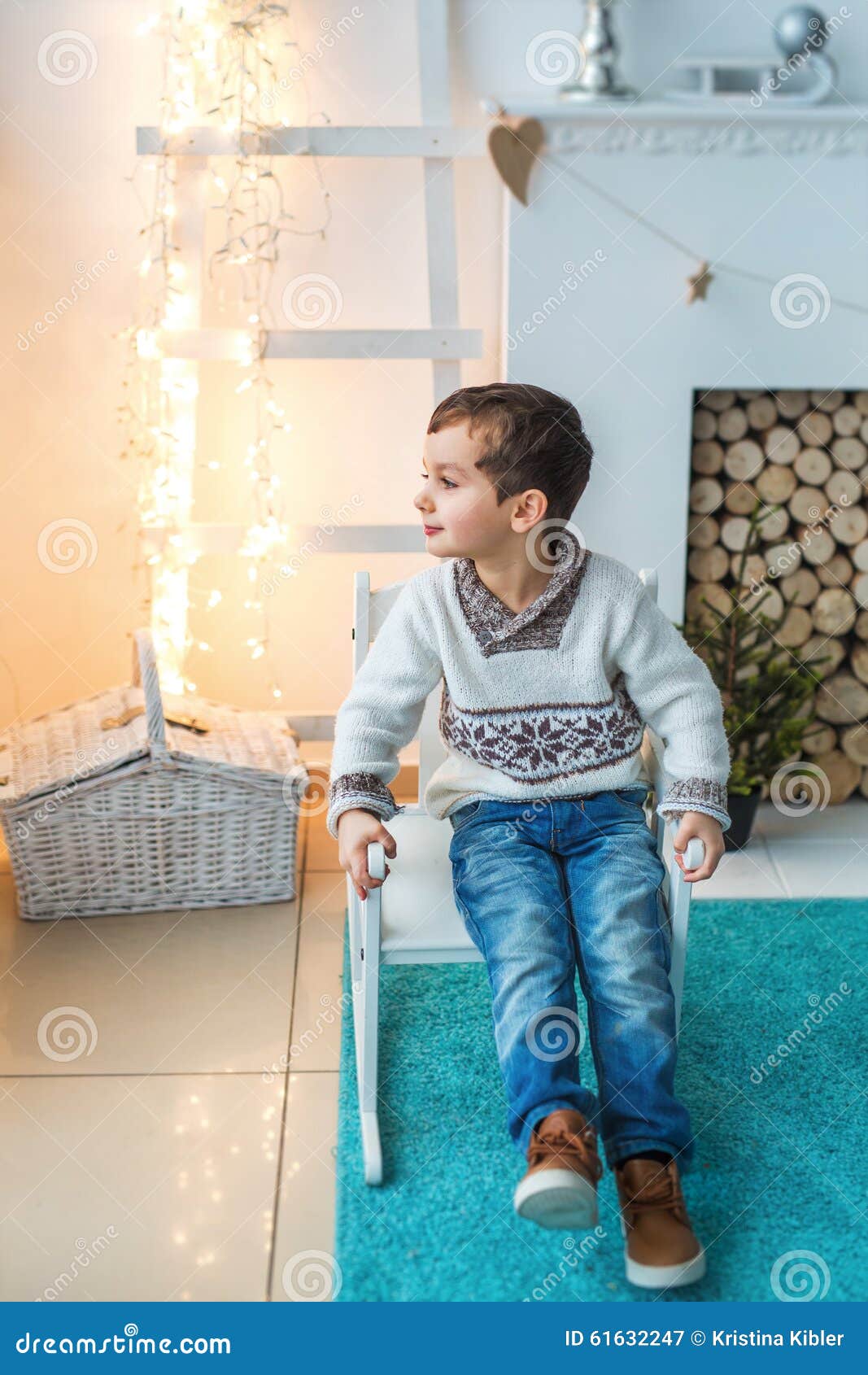 Cute Boy Sits on a Rocking Chair in a Studio Stock Image - Image of ...