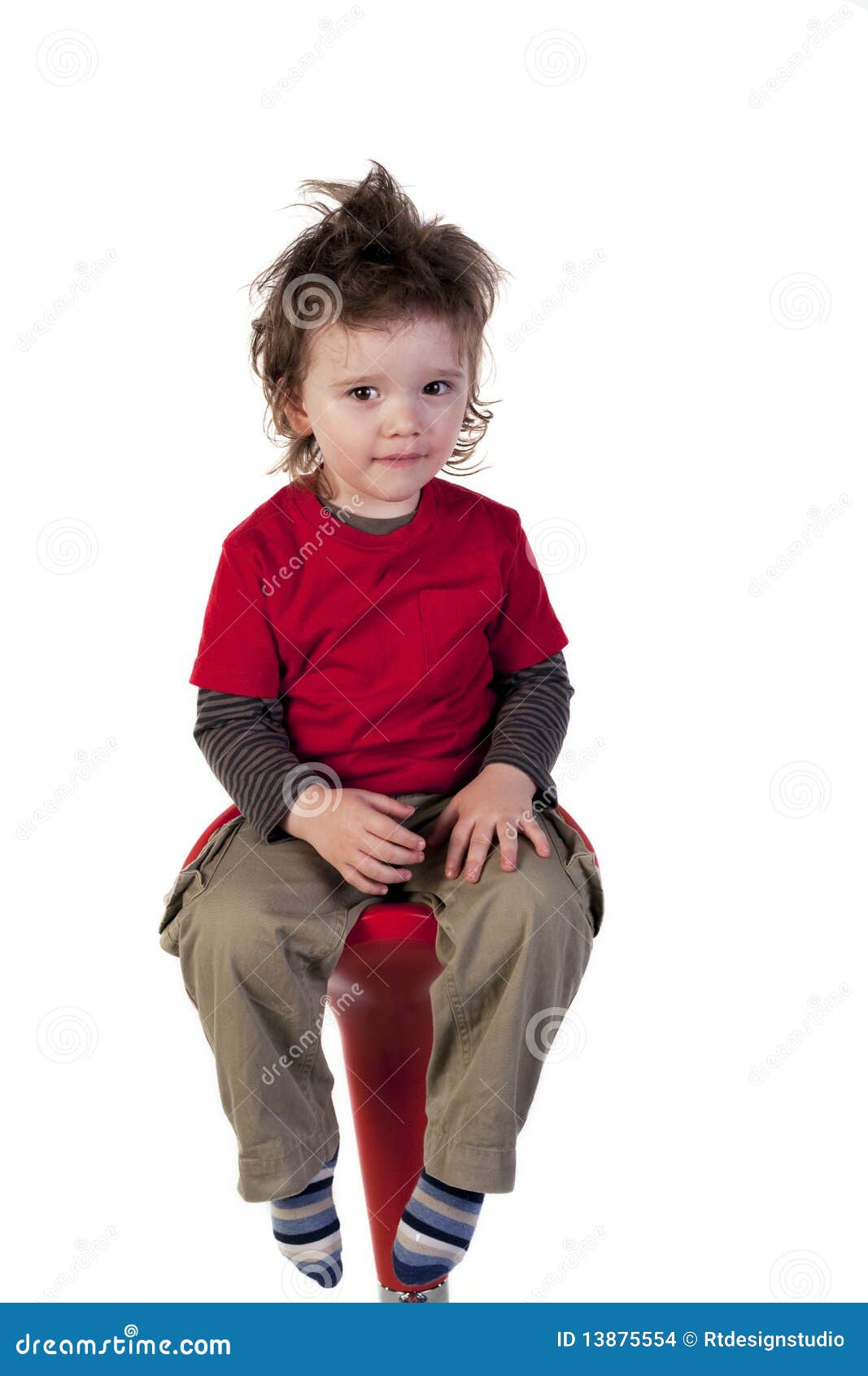 Cute Boy Sitting on a Chair Stock Photo - Image of innocence, hairstyle ...