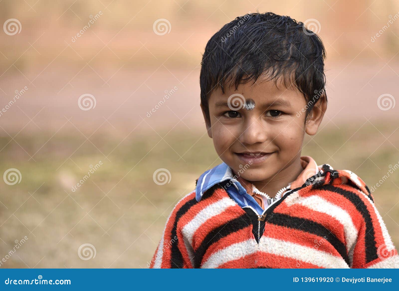 A Cute Boy stock photo. Image of cheerful, ethnic, expression - 139619920