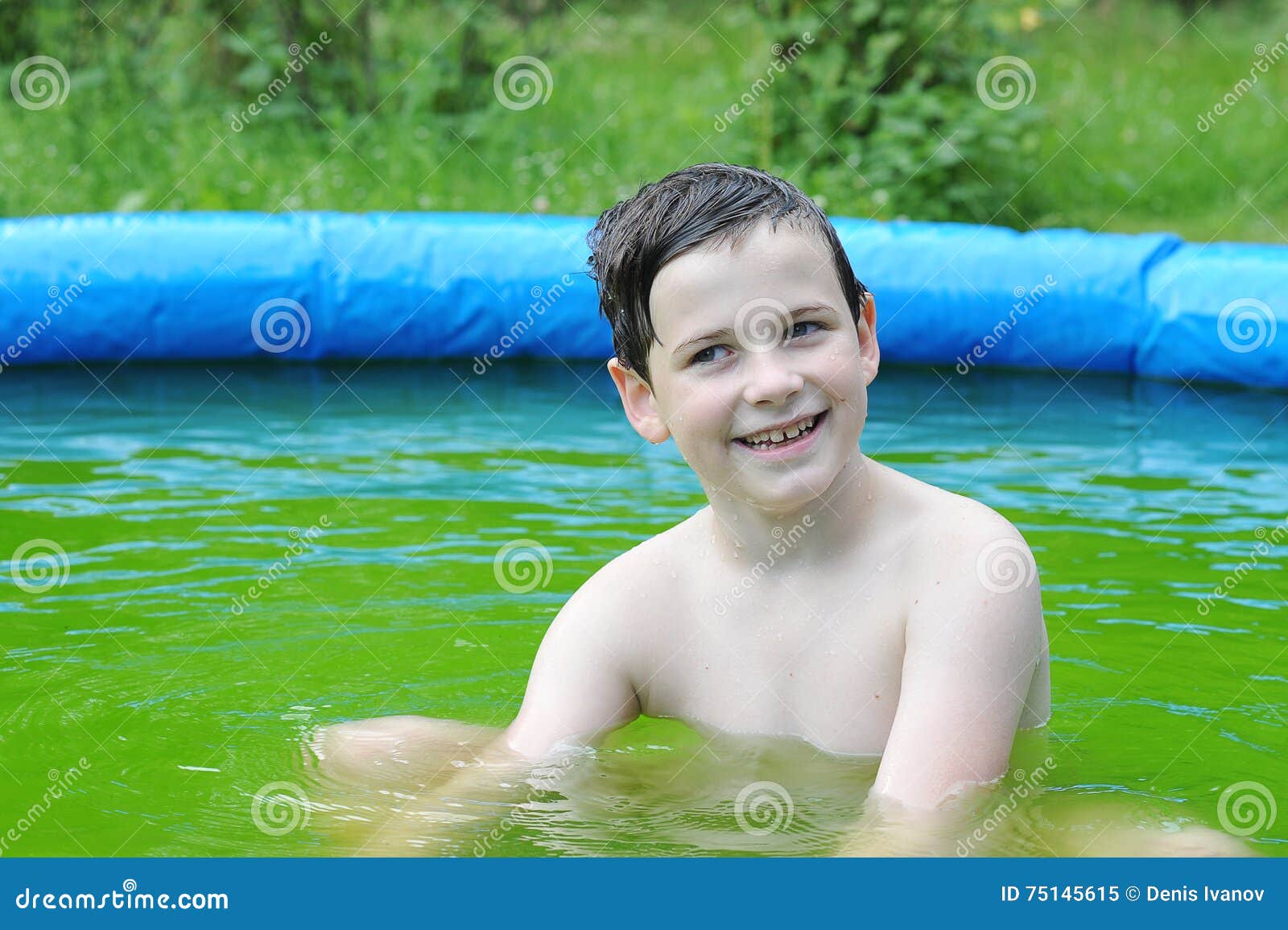 Cute Boy Smiling and Sitting in a Pool Stock Image - Image of goggles ...