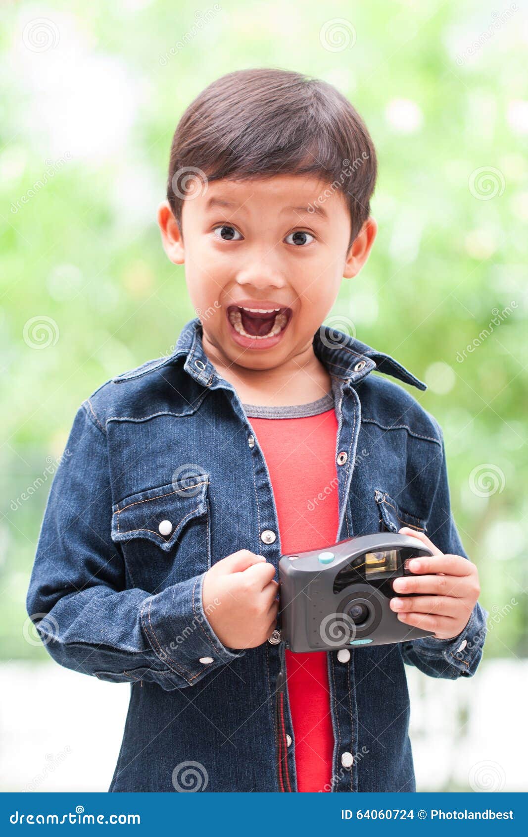 Cute Boy Using Compact Camera. Stock Photo - Image of background ...