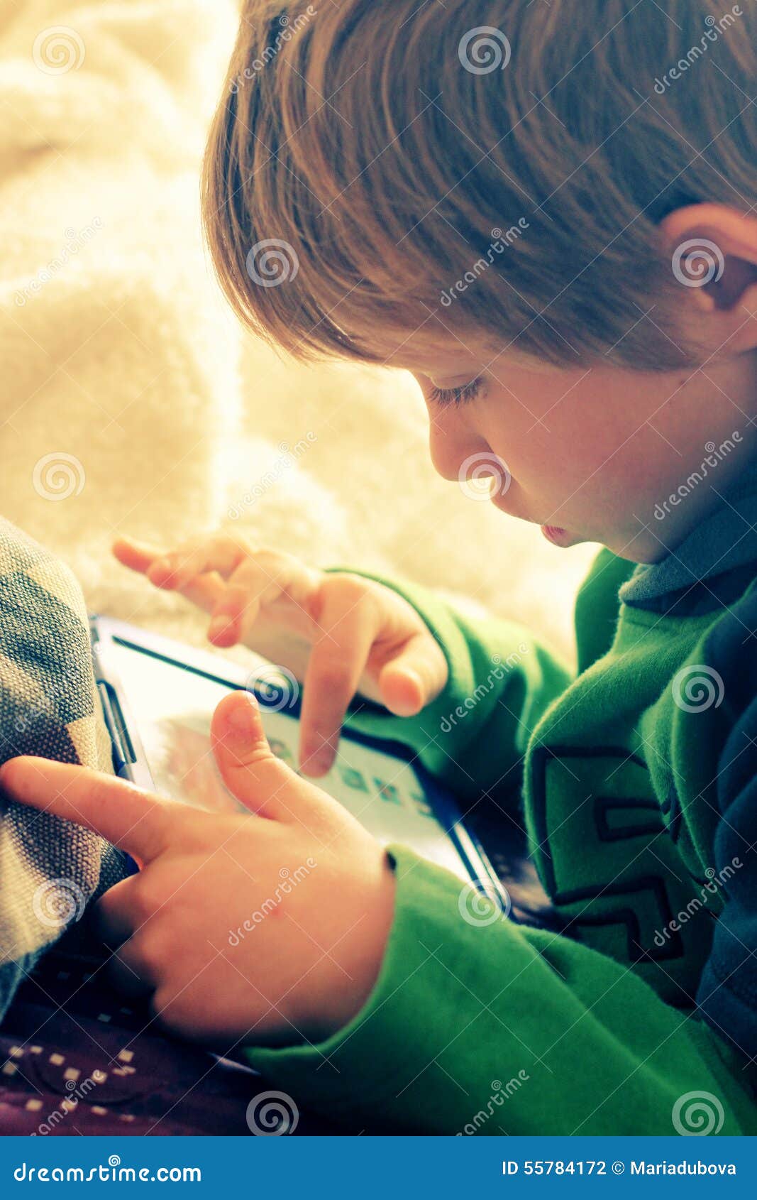 Cute boy using a laptop stock photo. Image of caucasian - 55784172