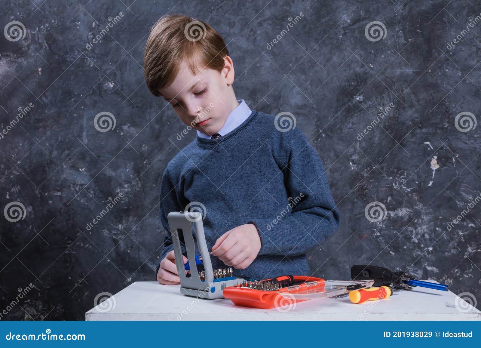 Cute Boy with Working Tools Studio Portrait. Stock Image - Image of ...