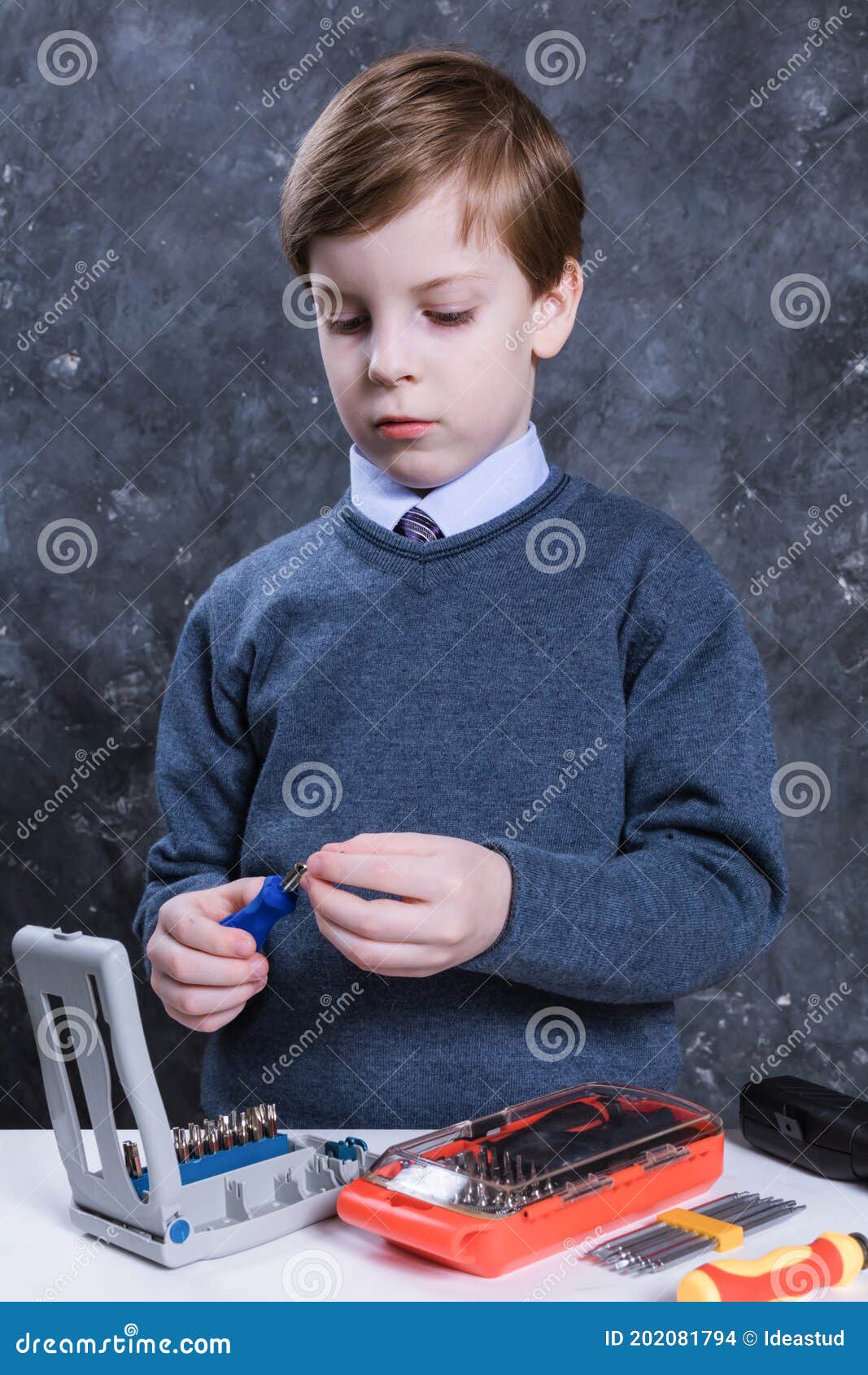 Cute Boy with Working Tools Studio Portrait. Stock Photo - Image of ...