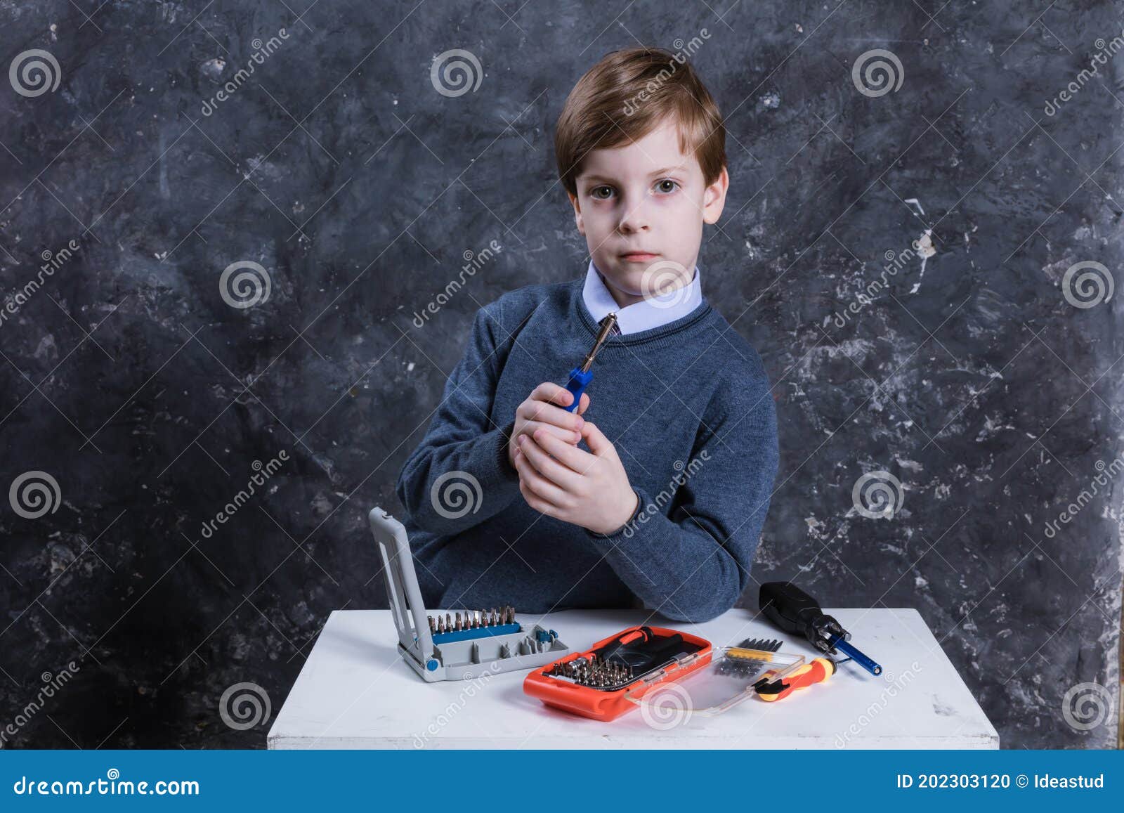 Cute Boy with Working Tools Studio Portrait. Stock Photo - Image of ...
