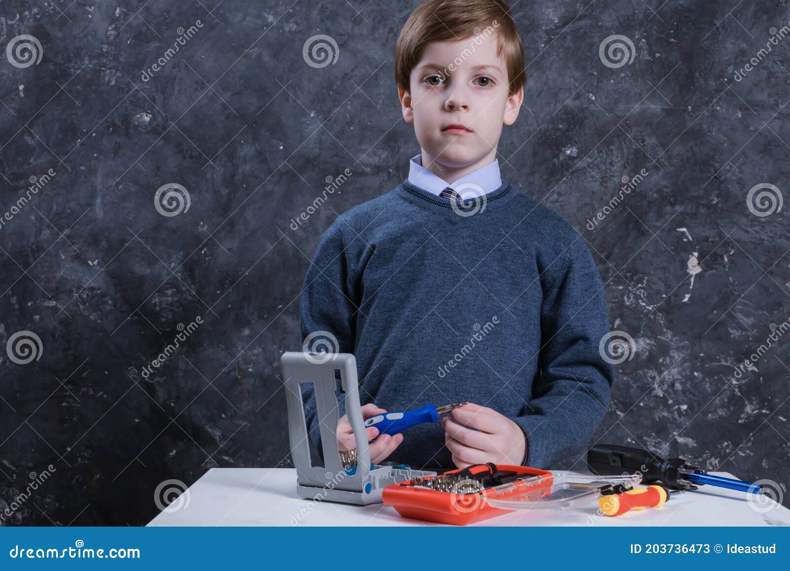 Cute Boy with Working Tools Studio Portrait. Stock Image - Image of ...