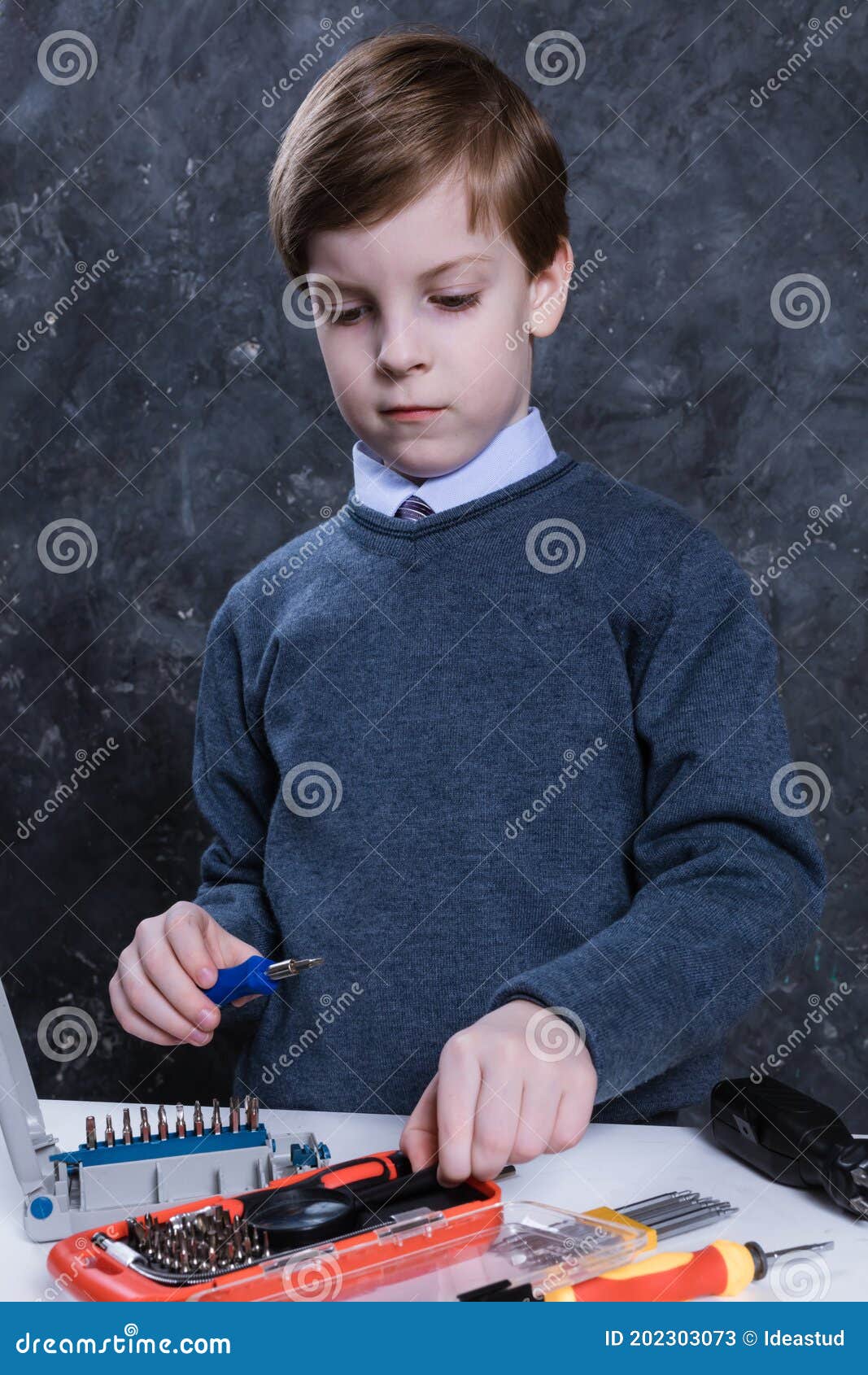 Cute Boy with Working Tools Studio Portrait. Stock Image - Image of ...