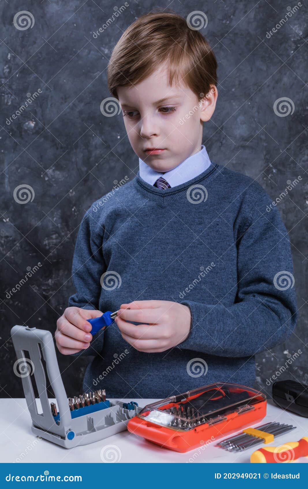 Cute Boy with Working Tools Studio Portrait. Stock Image - Image of ...
