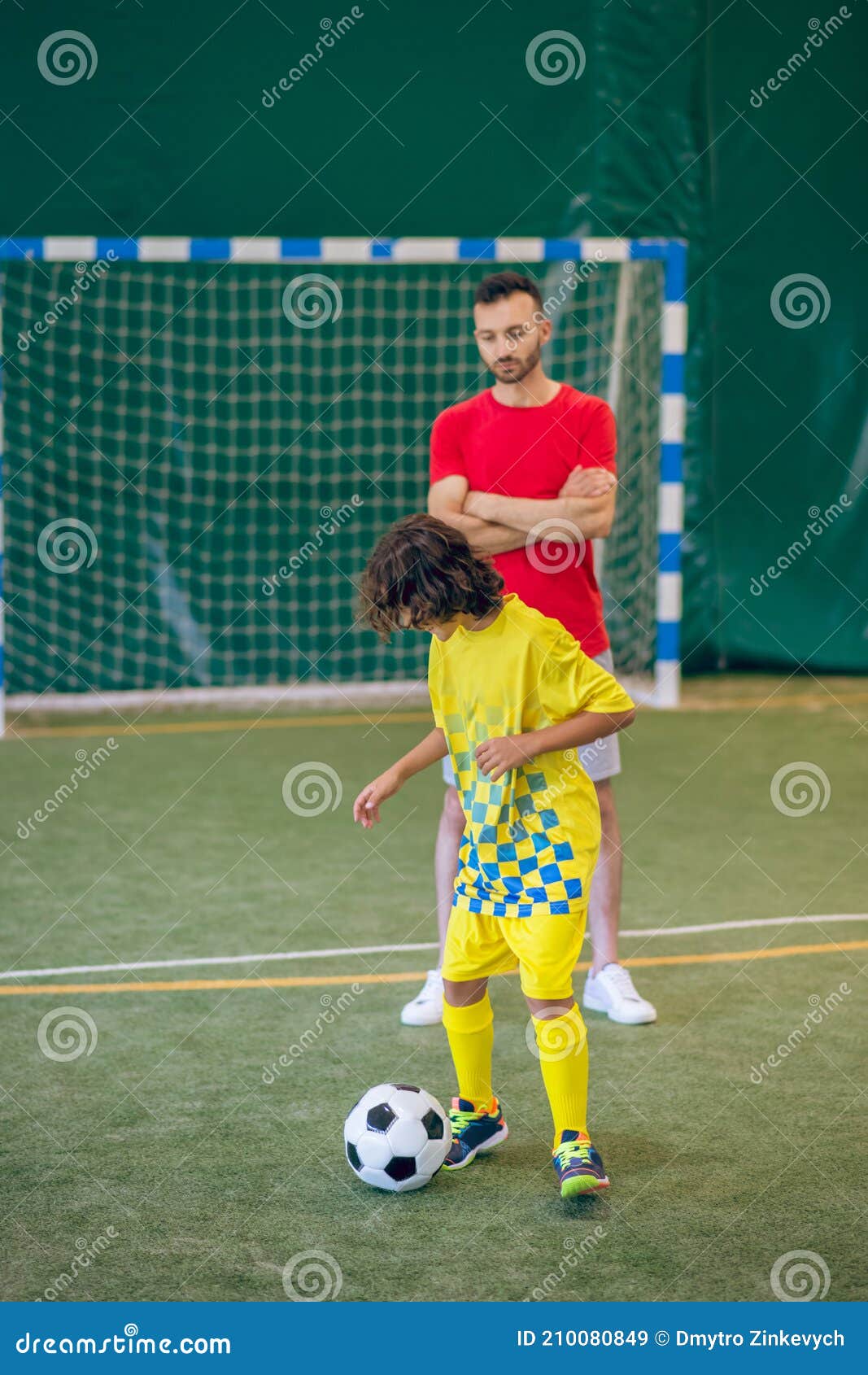 Cute Boy in Yellow Uniform Feeling Good at PE Lesson Stock Image ...