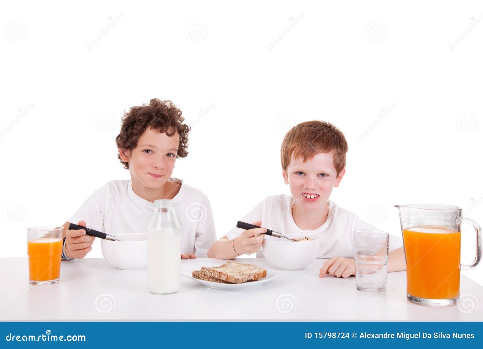 Cute boys taking breakfast stock photo. Image of male - 15798724