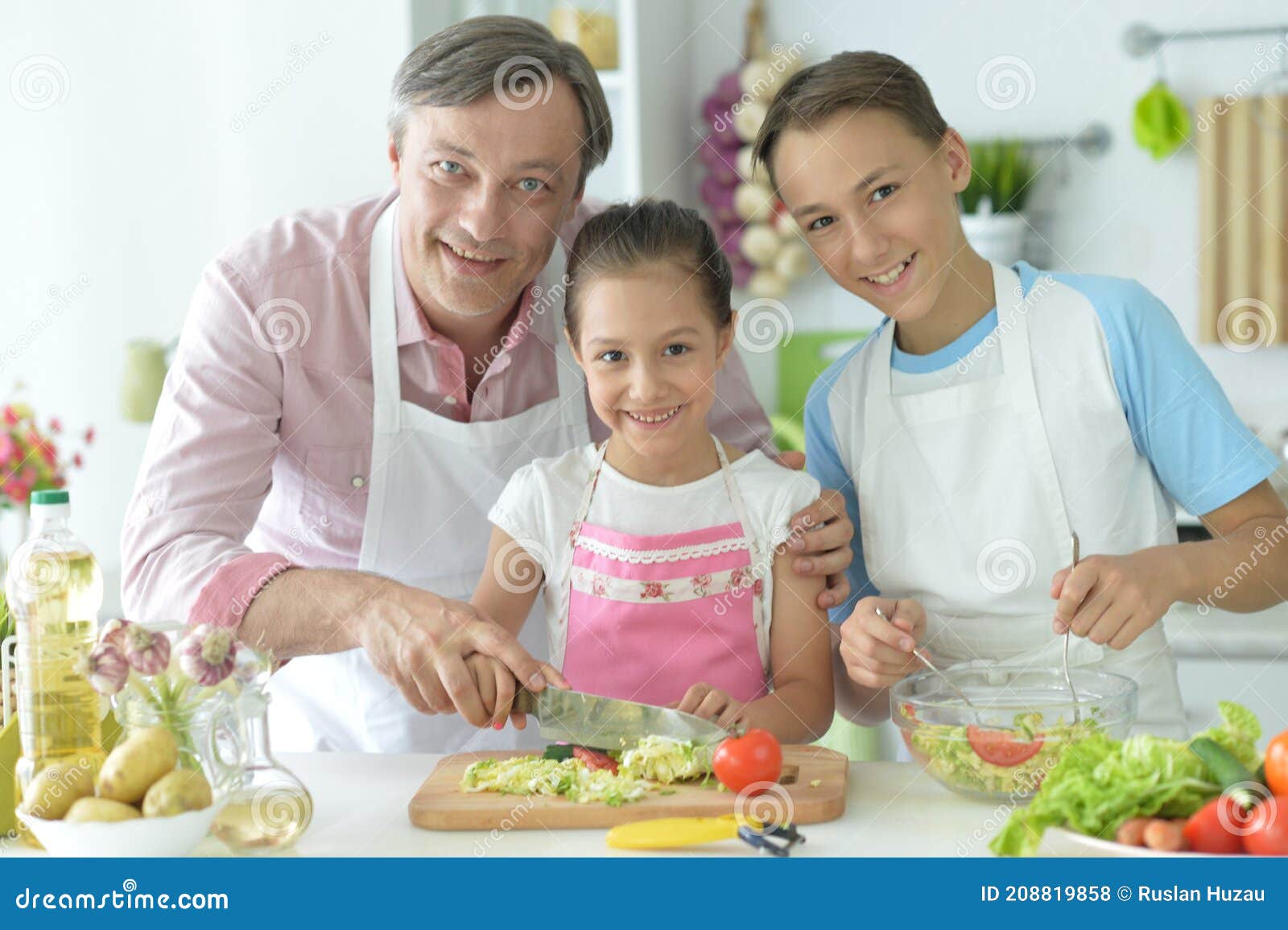 Cute Brother and Sister and Father Cooking Together in Kitchen Stock ...