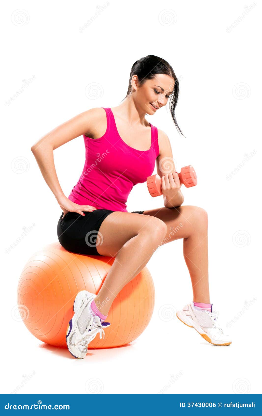 Cute Brunette Sitting on the Ball Stock Photo - Image of floor ...