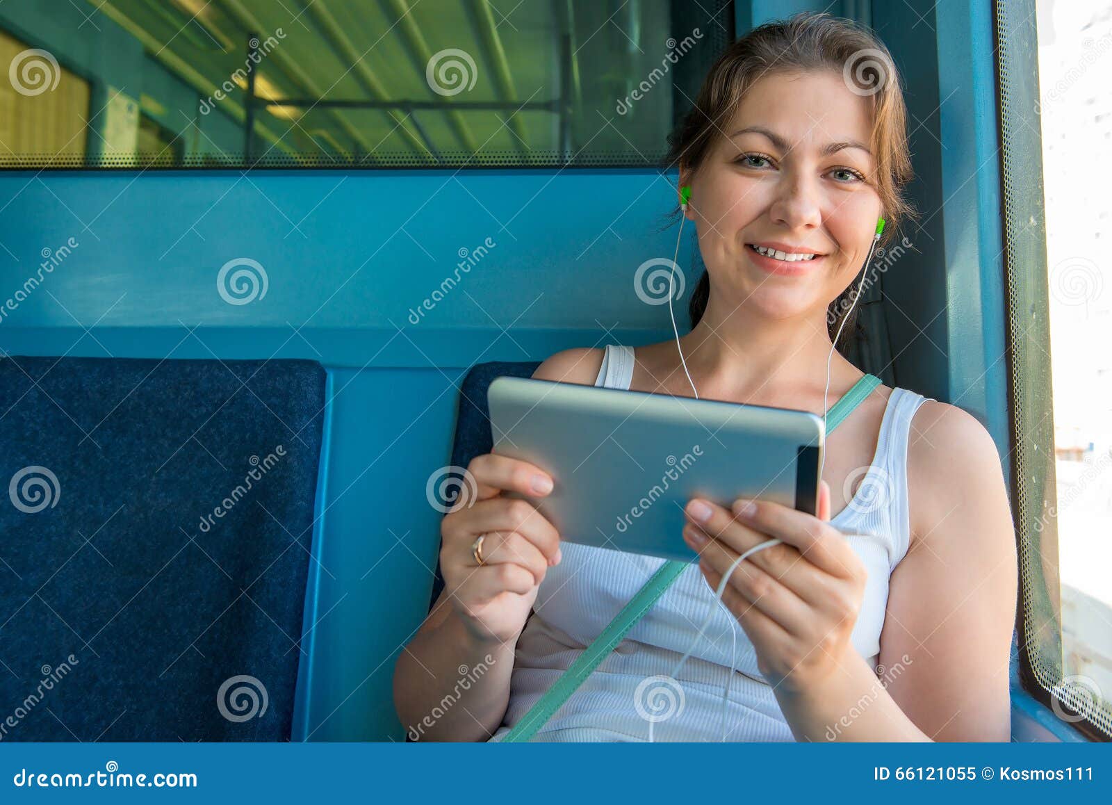 Cute Brunette with a Tablet in the Subway Stock Image - Image of ...