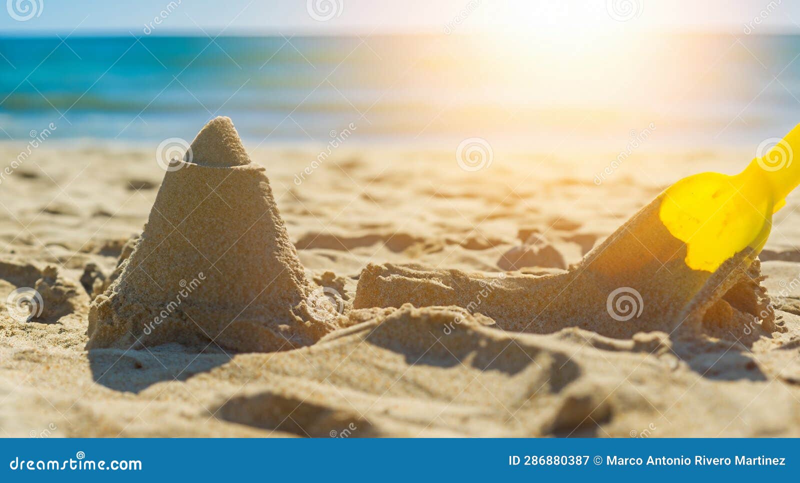 Cute castle made of sand stock image. Image of water - 286880387
