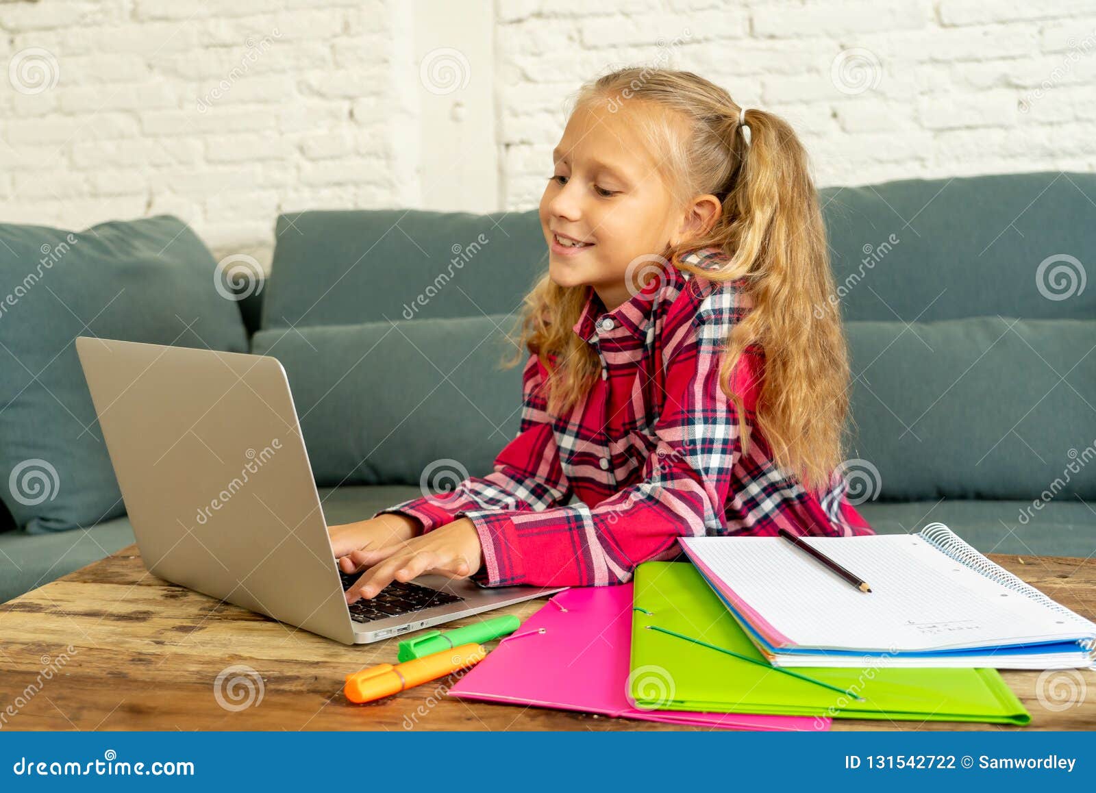 Cute Caucasian Cheerful Elementary Student Feeling Happy while Doing ... Cute Caucasian Cheerful Elementary Student Feeling Happy while Doing ...