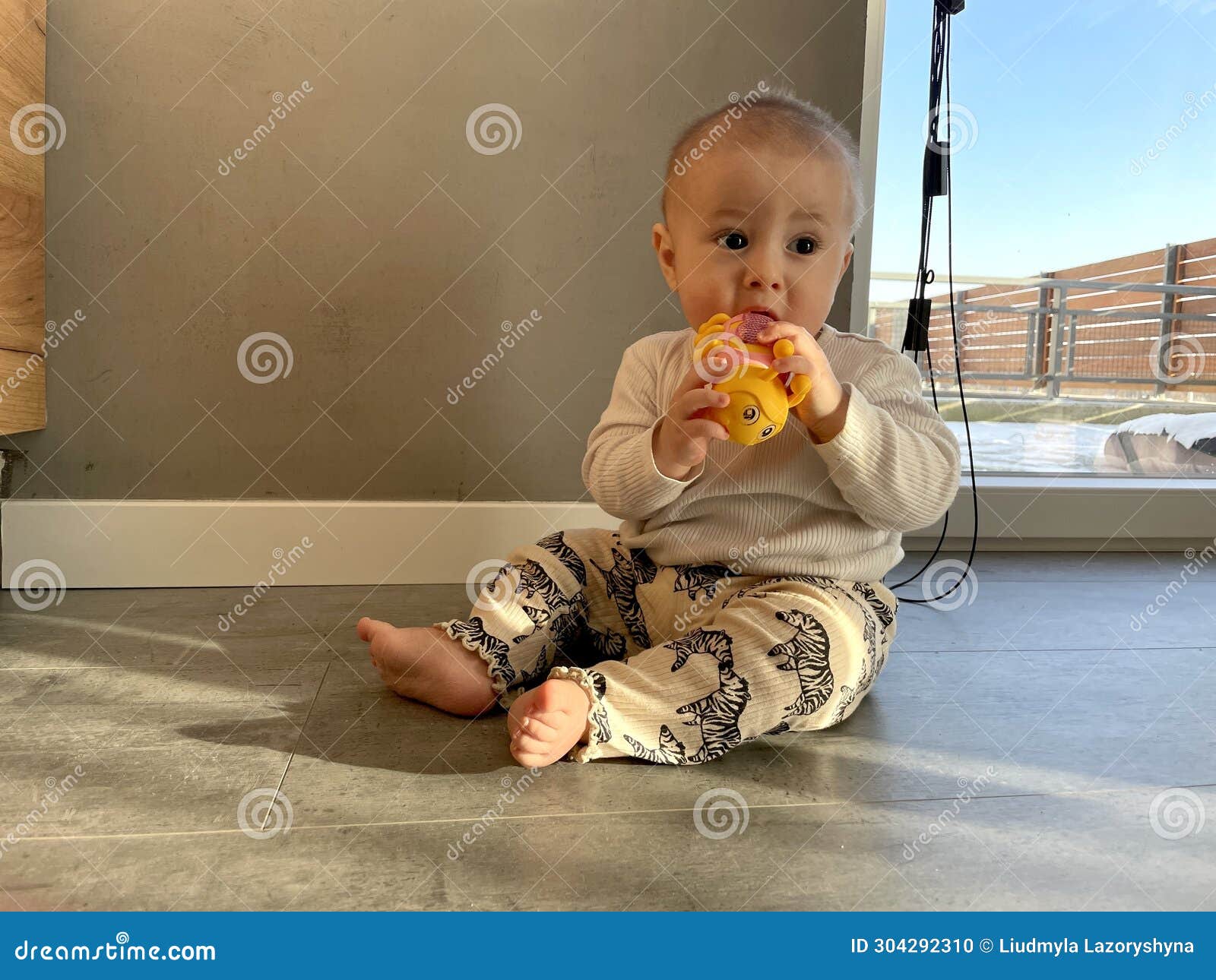 A Cute Charming Baby is Playing with a Toy Stock Photo - Image of baby ...