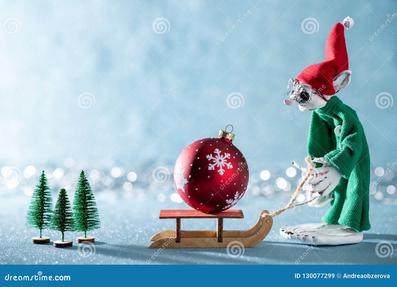 Sad Santas Helper Elf Sitting On Sledge Looking At Broken Christmas ...