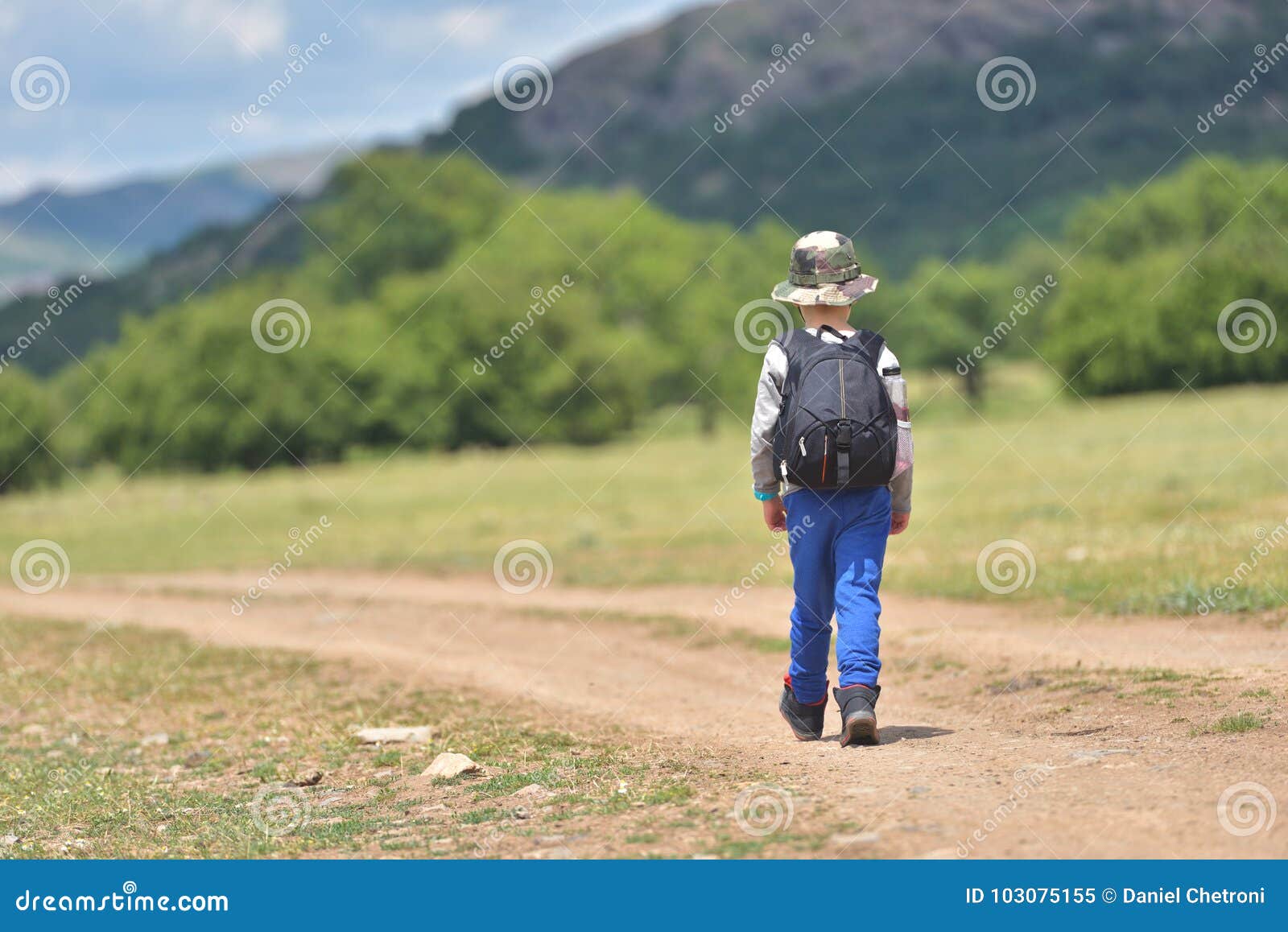 Cute Child Boy with Backpack Walking on a Little Path in Mountains ...
