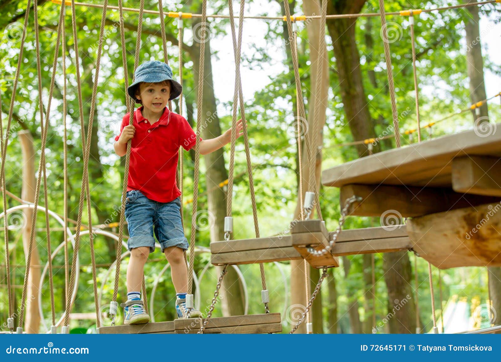 Cute Child, Boy, Climbing in a Rope Playground Structure Stock Image ...