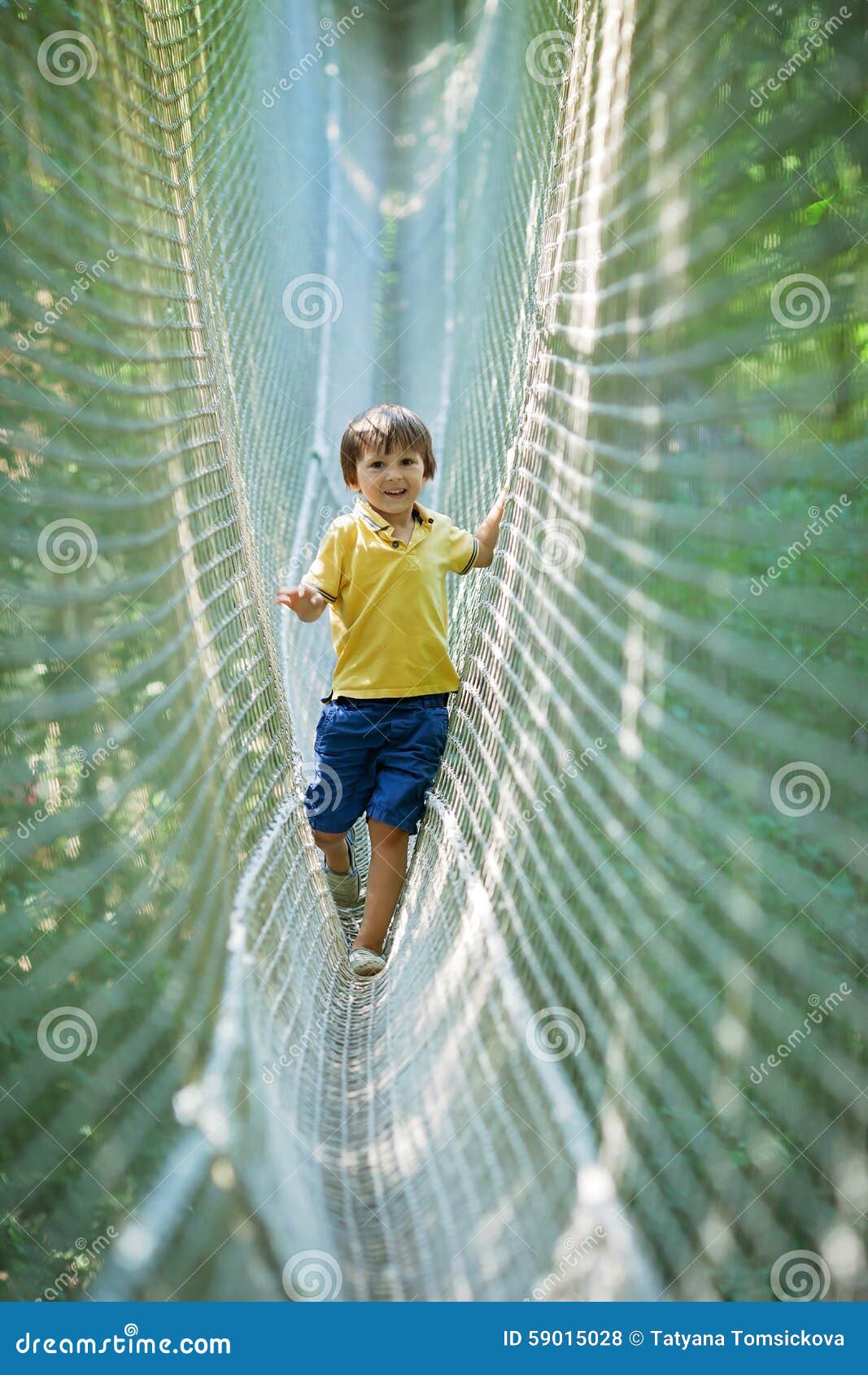 Cute Child, Boy, Walking in a Rope Playground Structure, Stock Photo ...