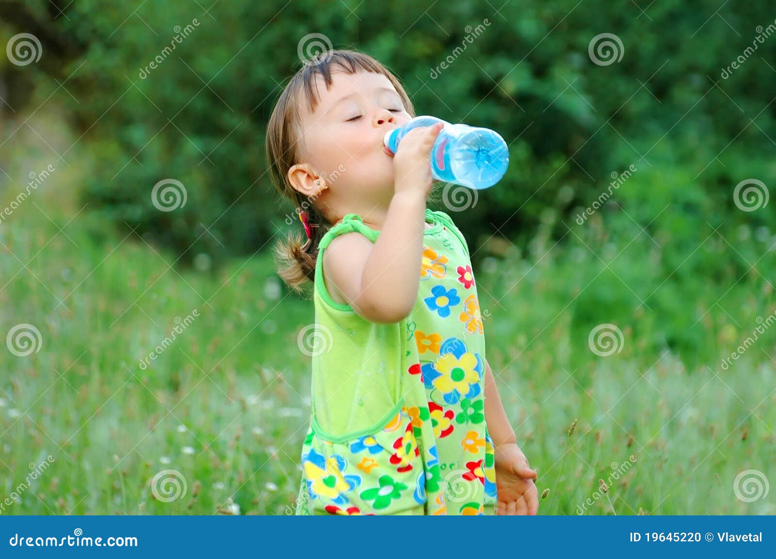 Cute Child Drinking Water stock photo. Image of close - 19645220