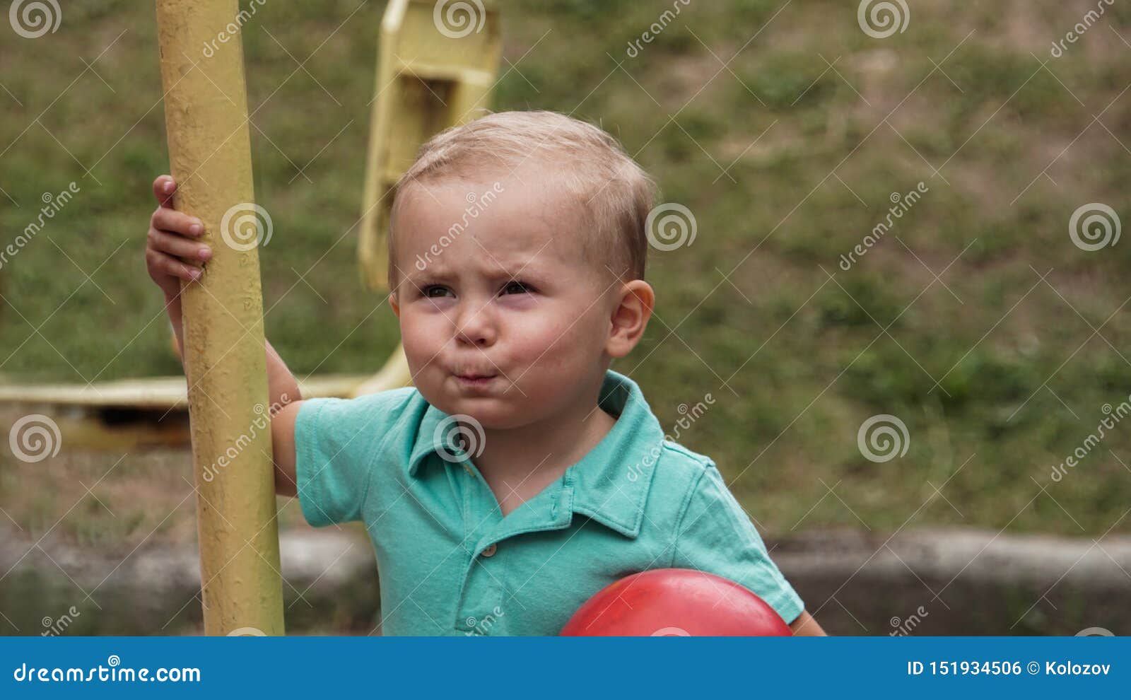 Cute Child Holding the Pole in a Play Ground Stock Photo - Image of ...