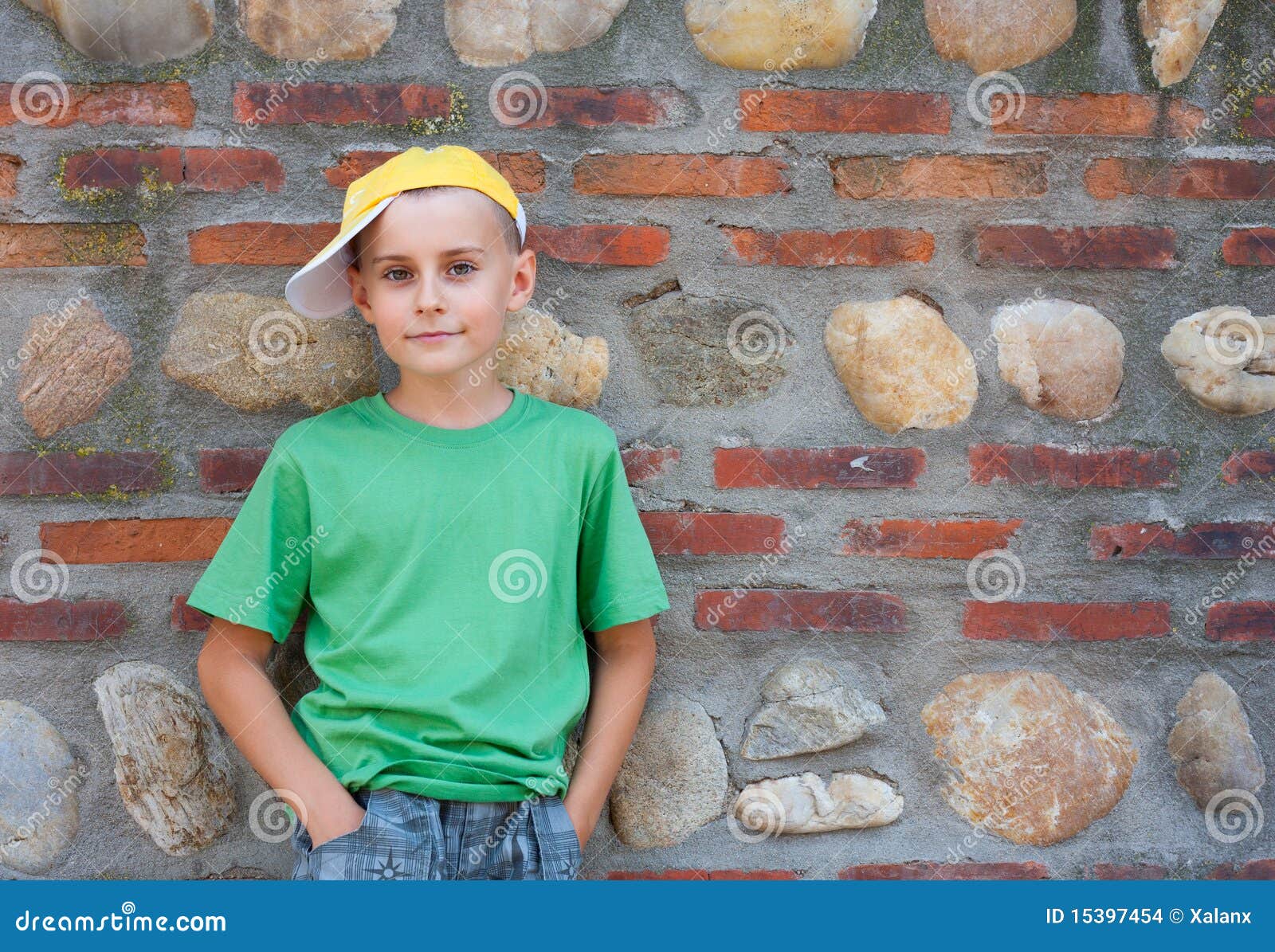 Cute Child Leaning on a Wall Stock Photo - Image of people, exterior ...