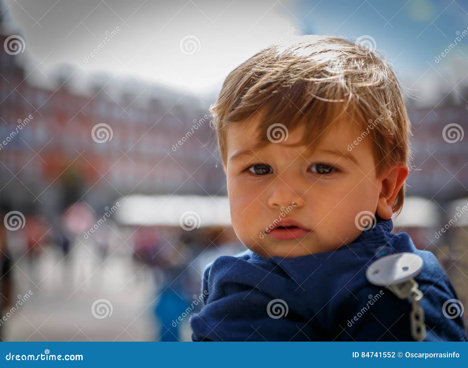 A Cute Child Looks Seriously Towards the Front Stock Photo - Image of ...