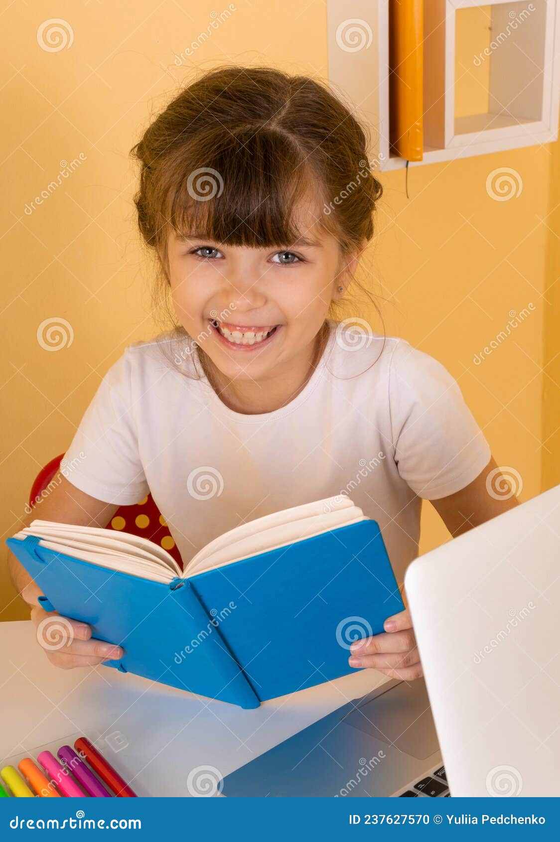 Cute Child with Notebook. Smart Kid with Book at Home Stock Photo ...