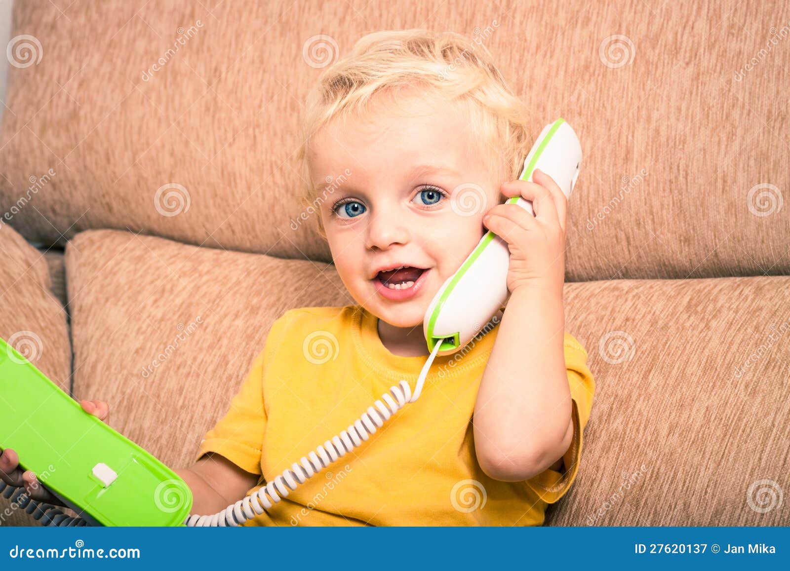 Cute child on the phone stock image. Image of listen - 27620137
