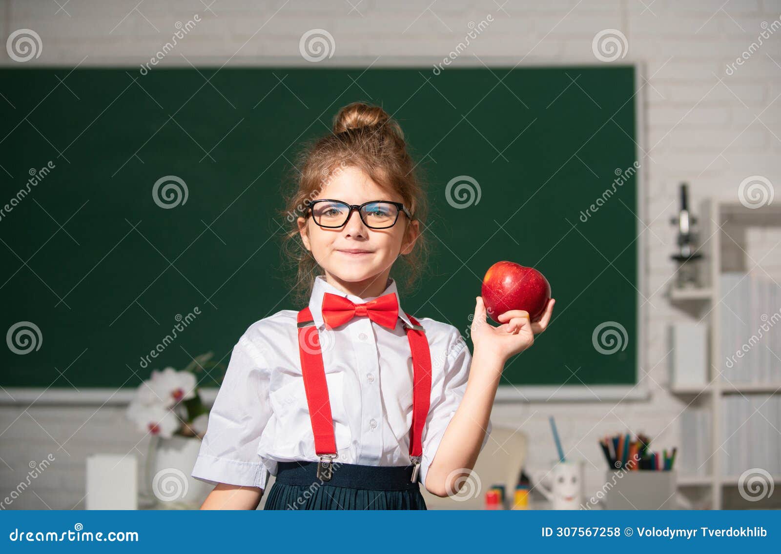 Cute Child at School. Kid is Learning in Class on Background of ...