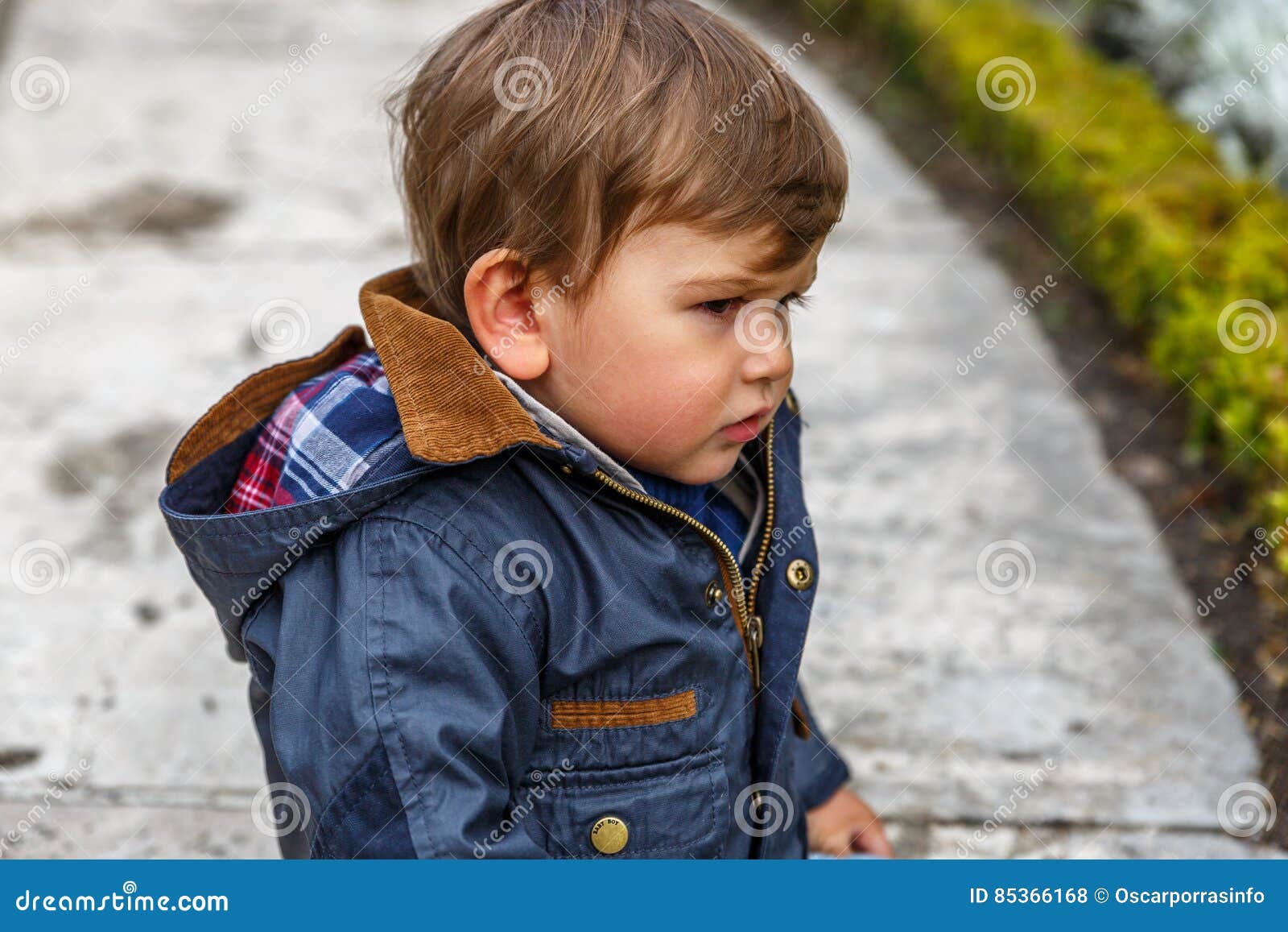 A Cute Child Shows a Little Anger Stock Photo - Image of infantile ...