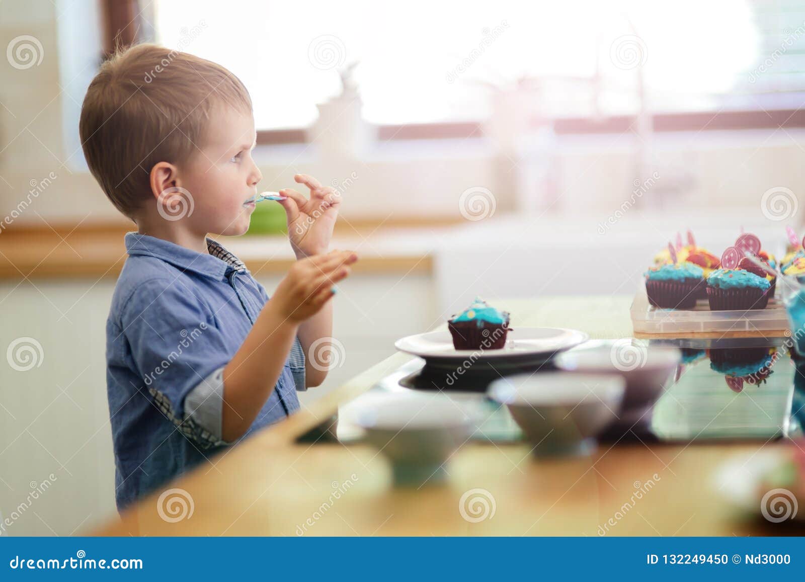 Cute child tasting cookies stock photo. Image of cookie - 132249450