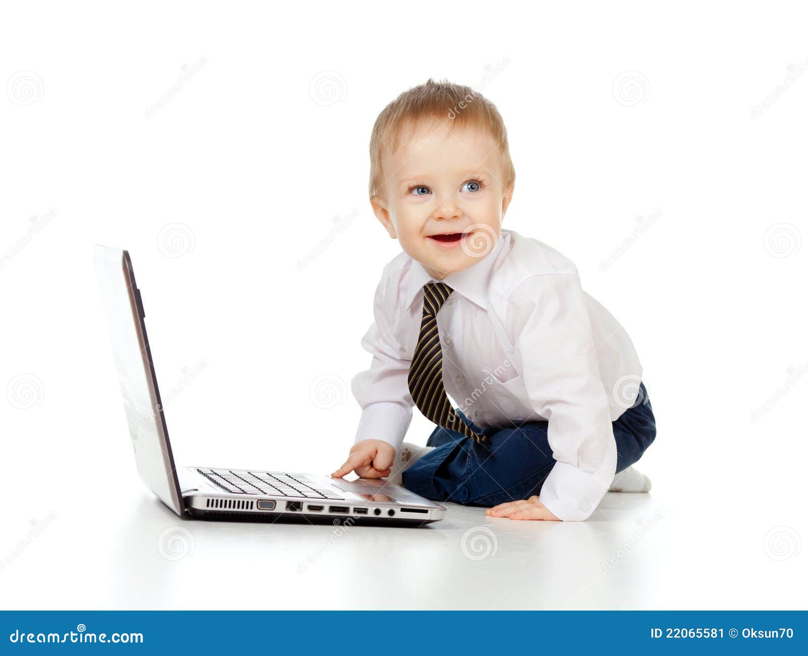 Cute child using laptop stock image. Image of happy, playing - 22065581