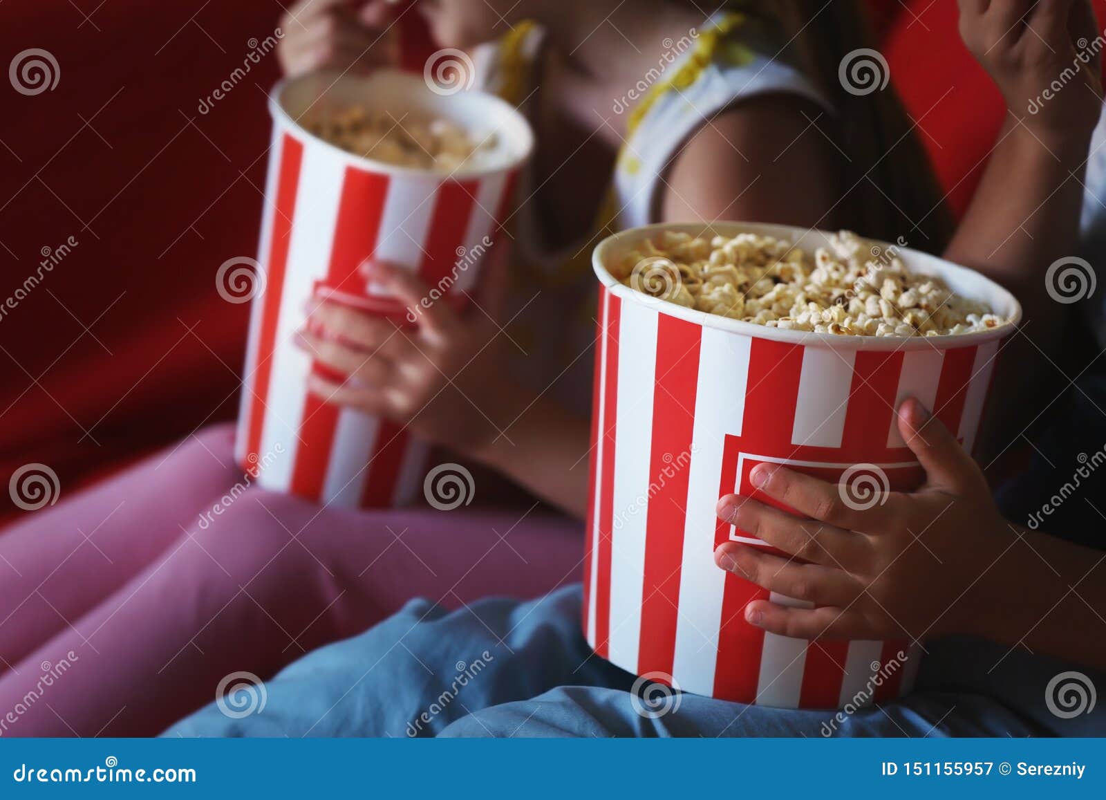 Cute Children Eating Popcorn while Watching TV in Evening Stock Image ...