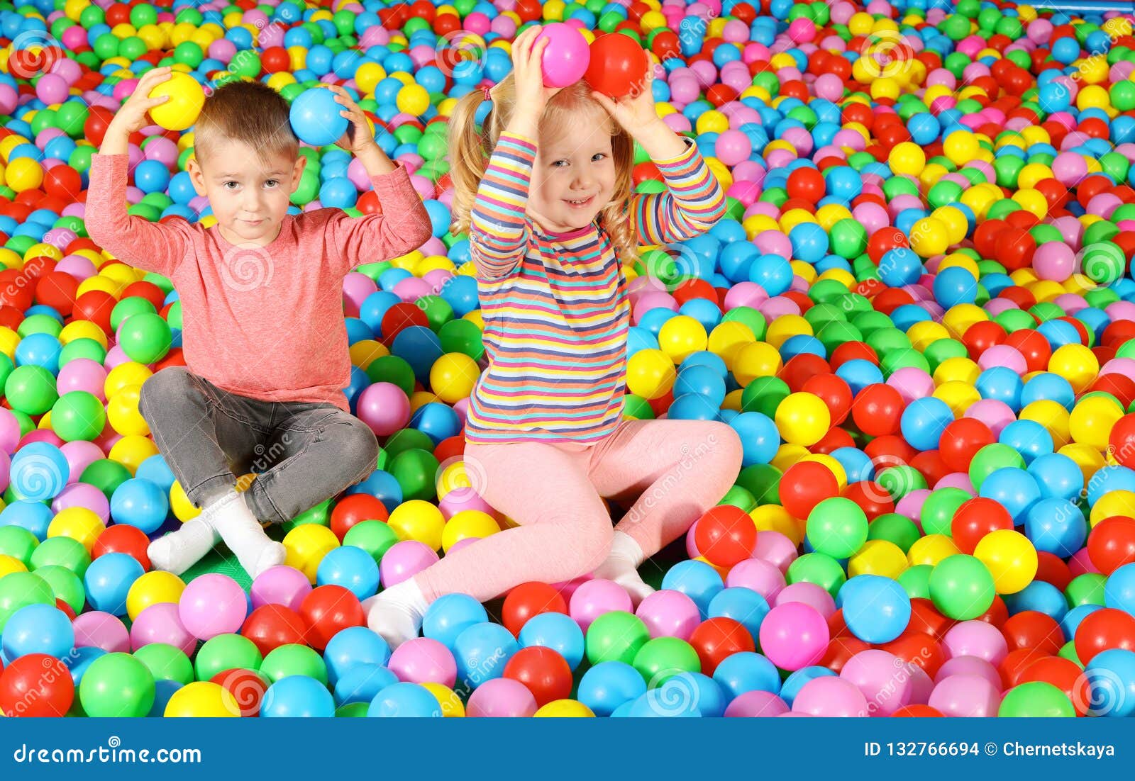 Cute Children Playing in Ball Pit Stock Photo - Image of indoors ...