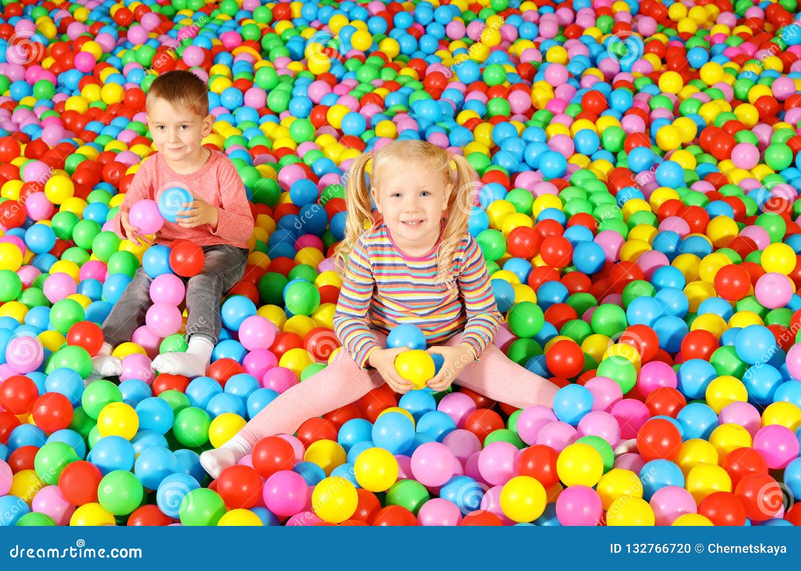 Cute Children Playing in Ball Pit Stock Photo - Image of plastic ...