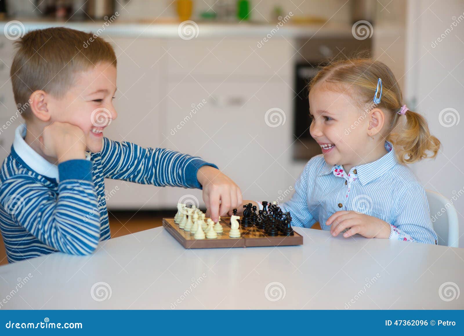 Cute Children Playing at Home Stock Photo - Image of looking, games ...