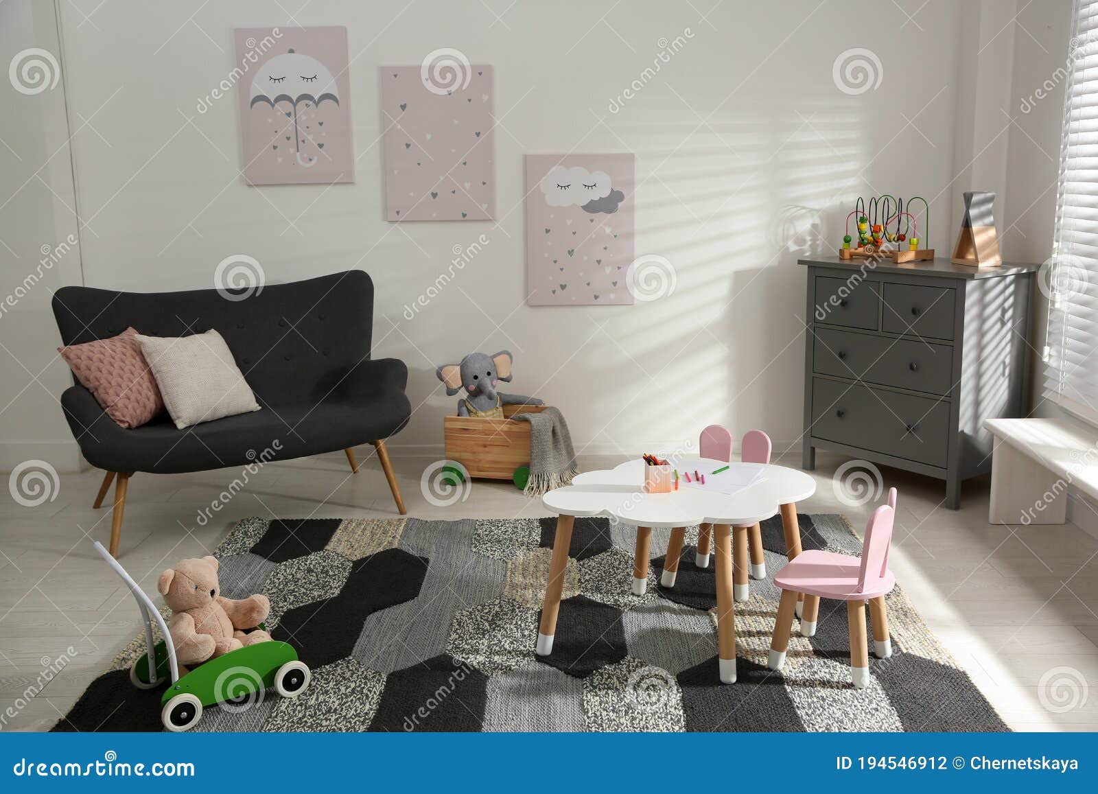Cute Children`s Room with Sofa and Little Table Stock Photo - Image of ...