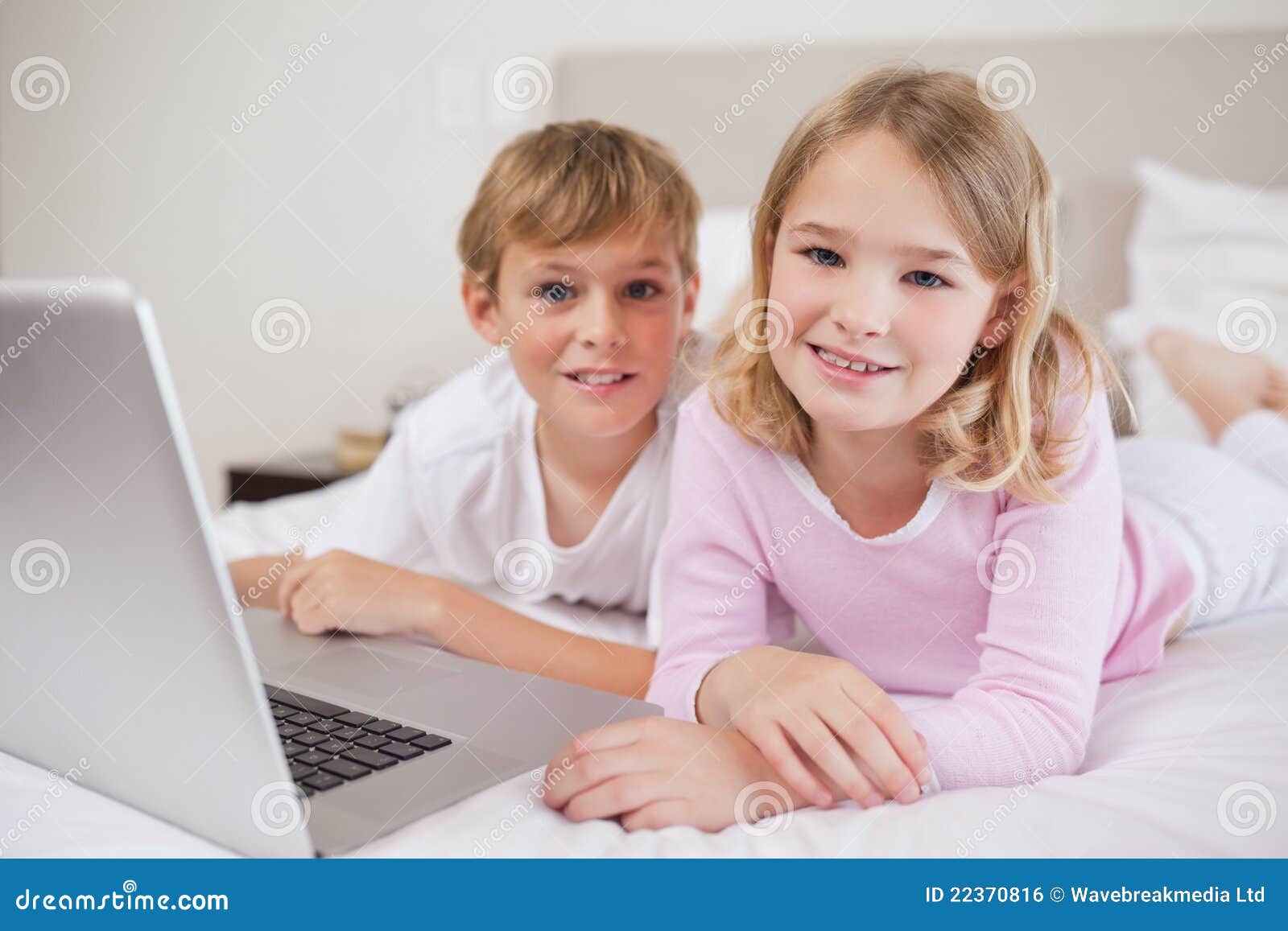 Cute Children Using a Notebook Stock Photo - Image of little, looking ...
