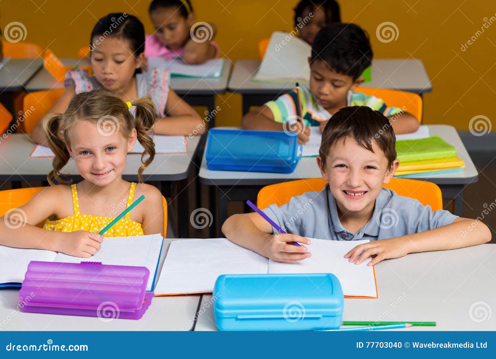 Cute Classmates Smiling in Classroom Stock Photo - Image of classmates ...