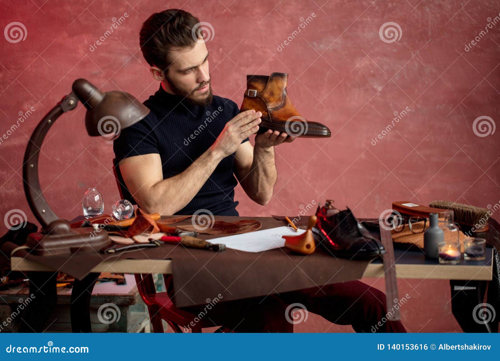 Cute Cobbler Exploring the Defect of the Shoes Stock Photo - Image of ...